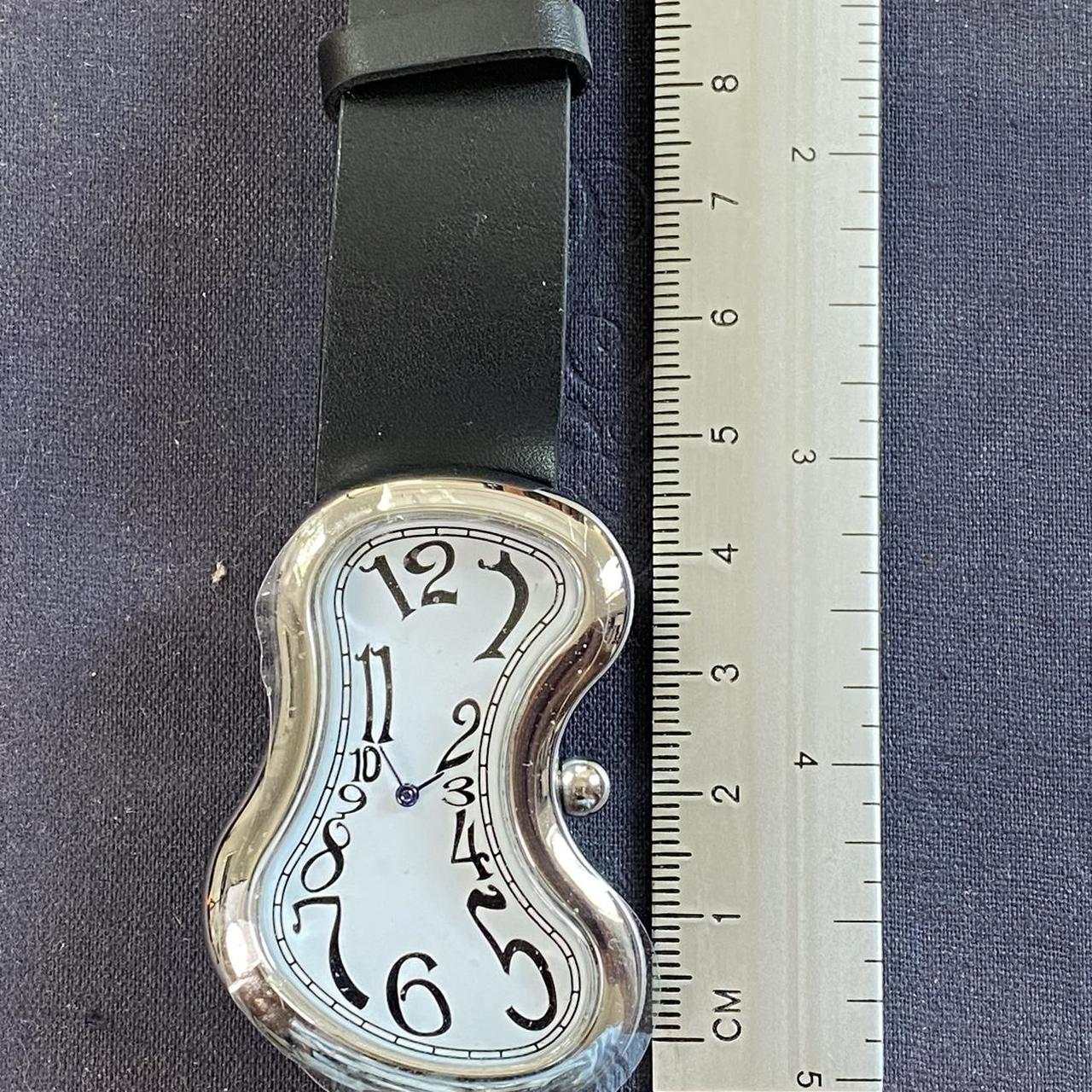 Salvador Dalí Melting clock watch All measurements... - Depop