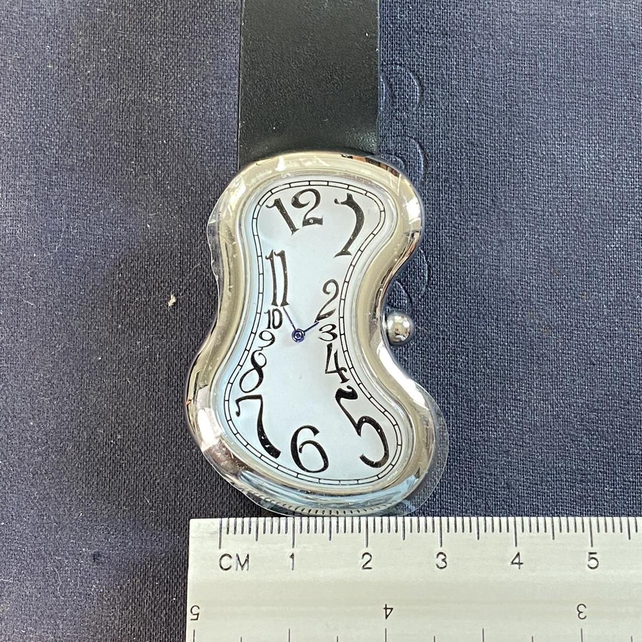 Salvador Dalí Melting clock watch All measurements... - Depop