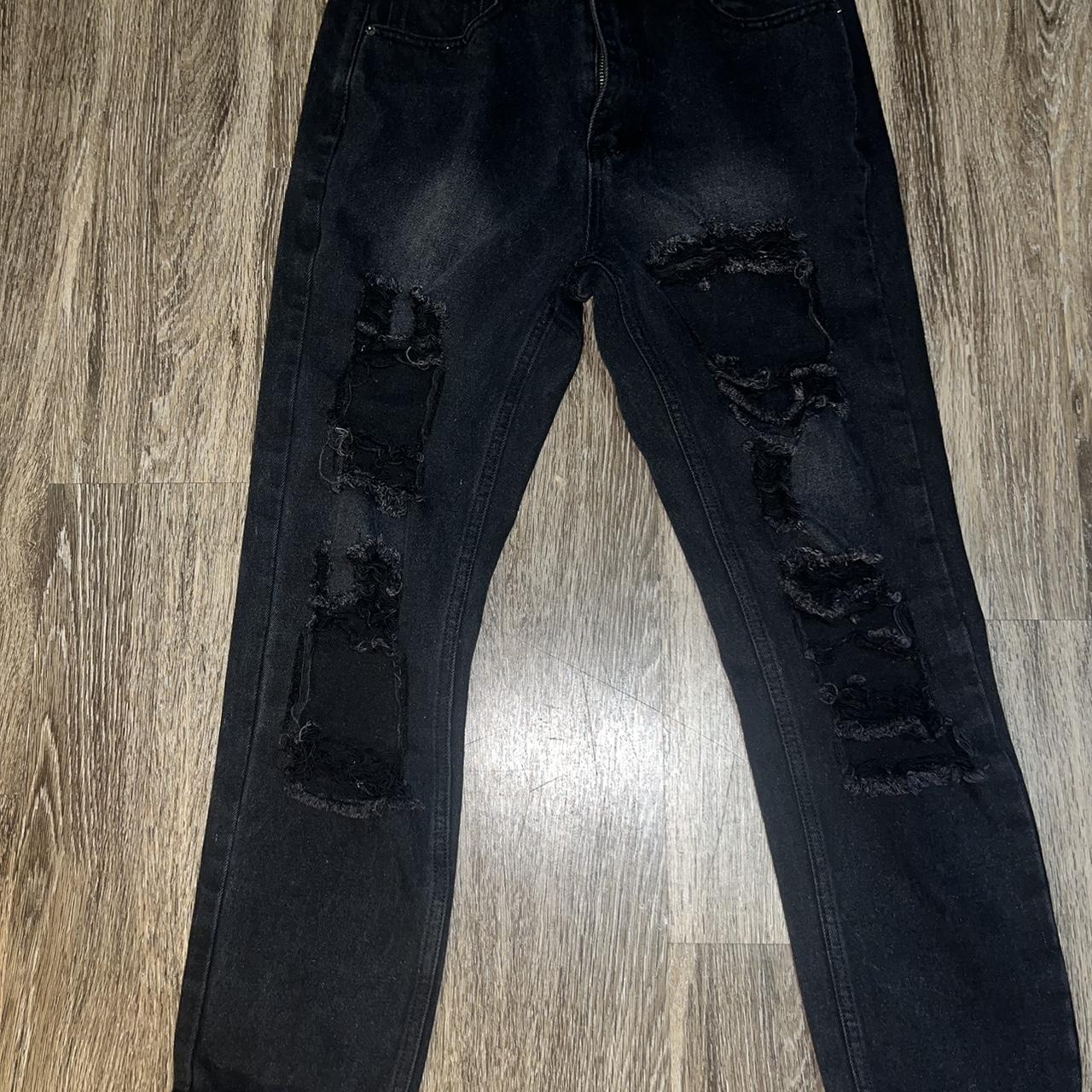 Black distressed ripped jeans, size 12 will fit... - Depop