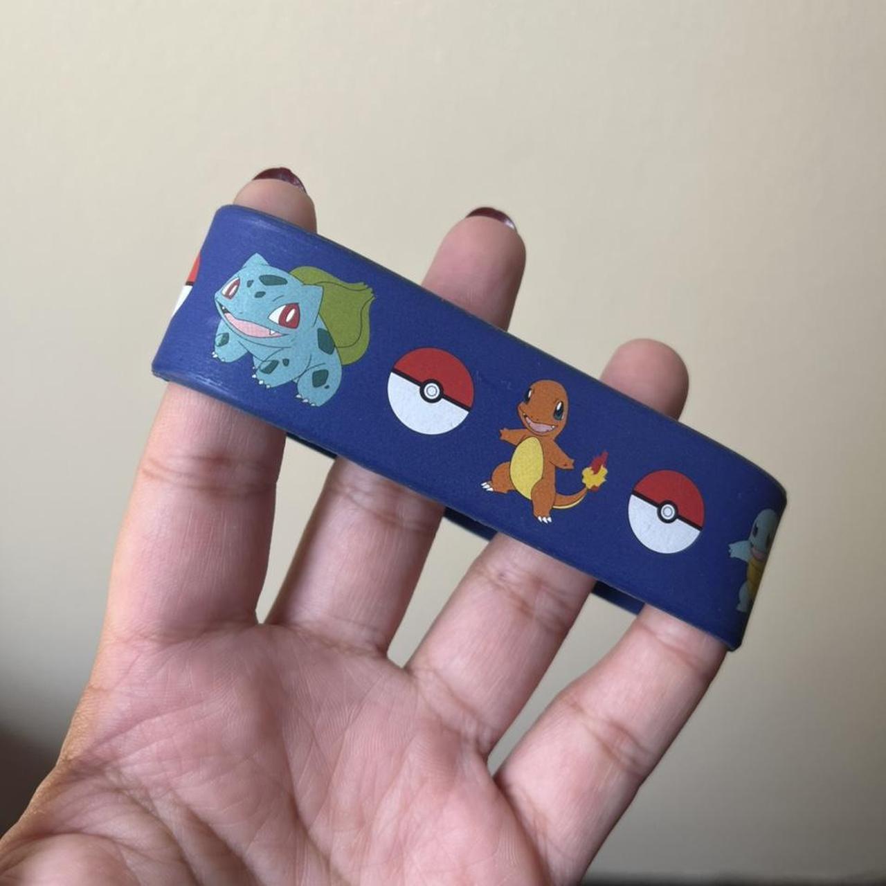 Reversible Pokemon rubber bracelet 🔥🐉 Pokémon logo... - Depop