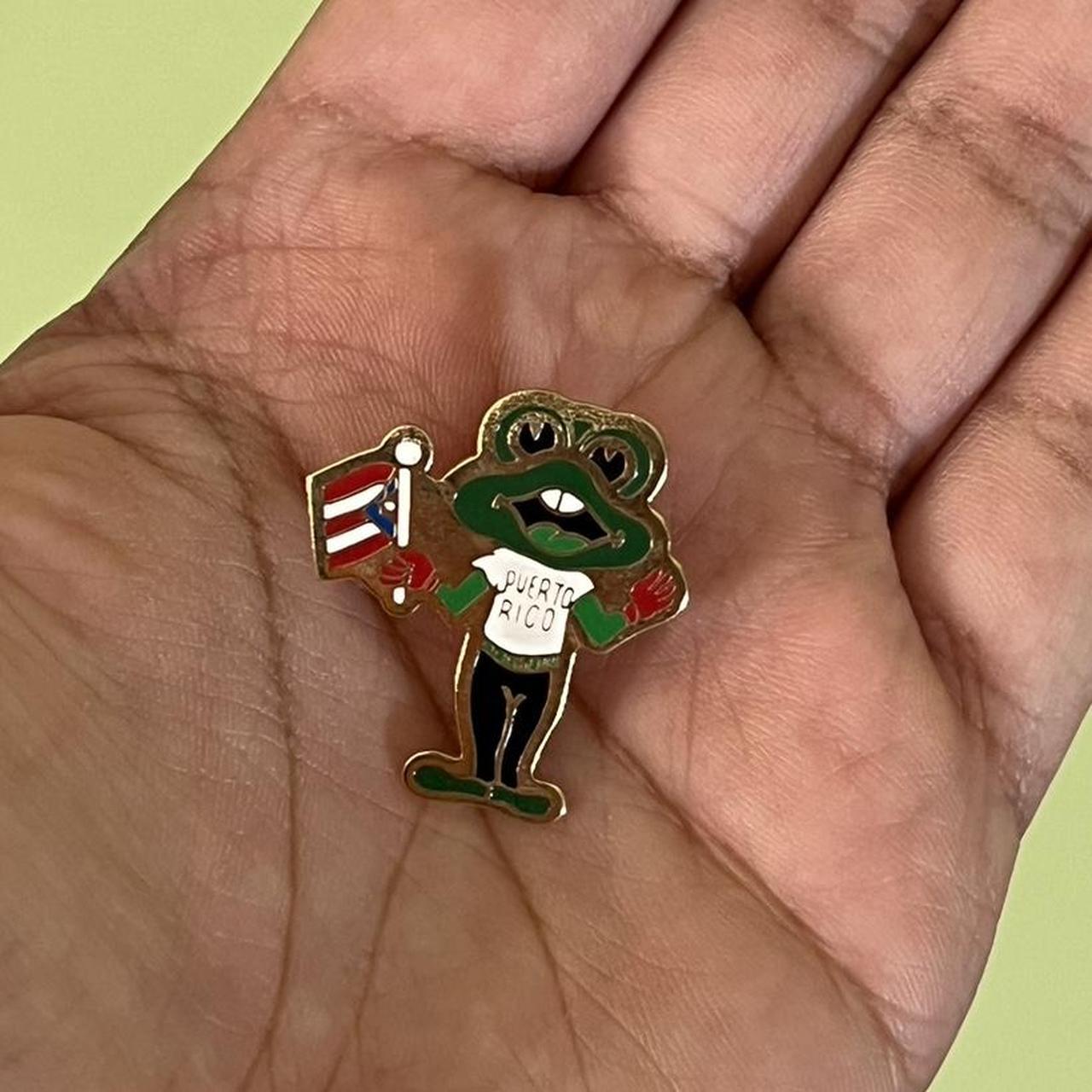 Puerto Rico souvenir pin Frog holding PR flag Has a... - Depop