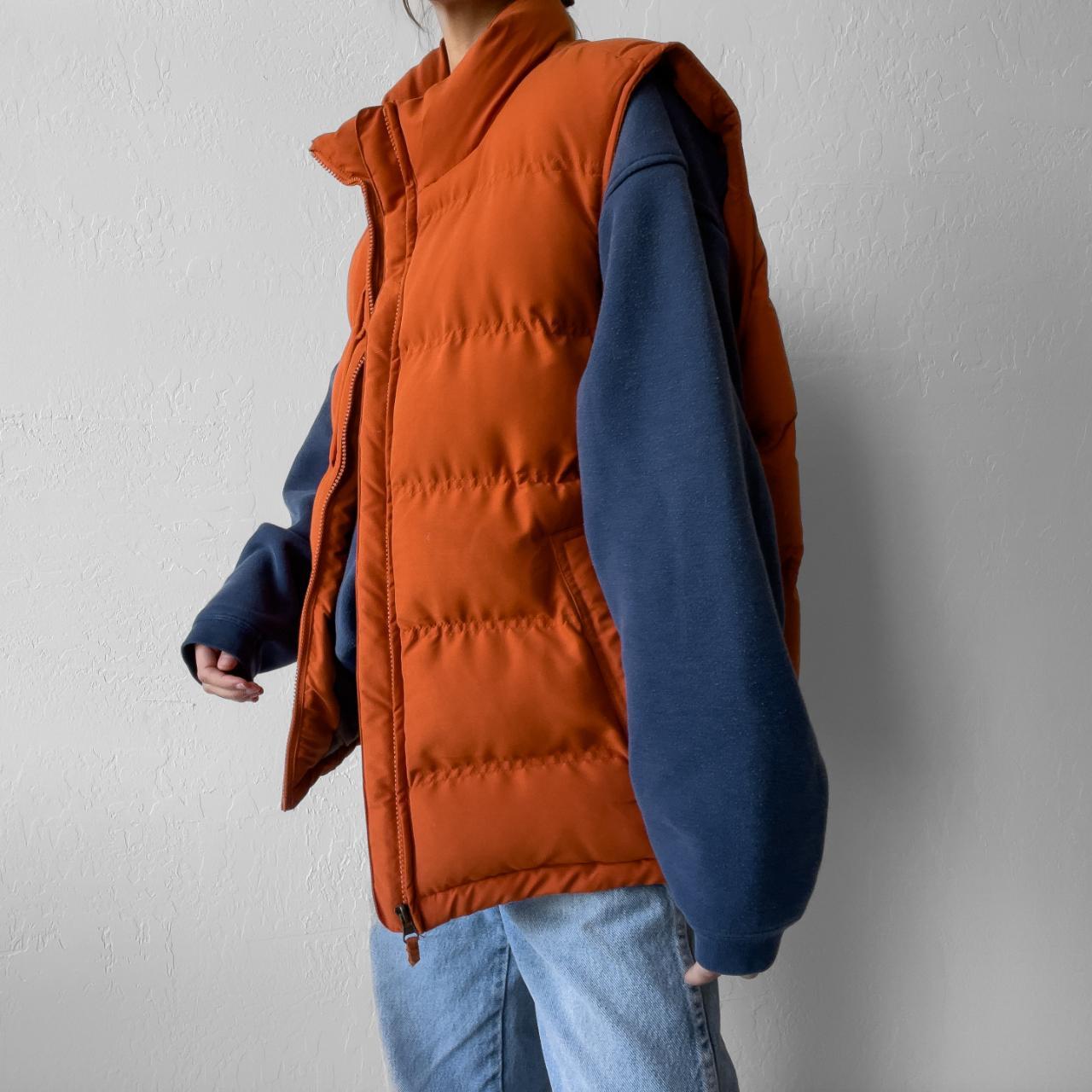 orange oversized puffer vest, pair it with an all... - Depop