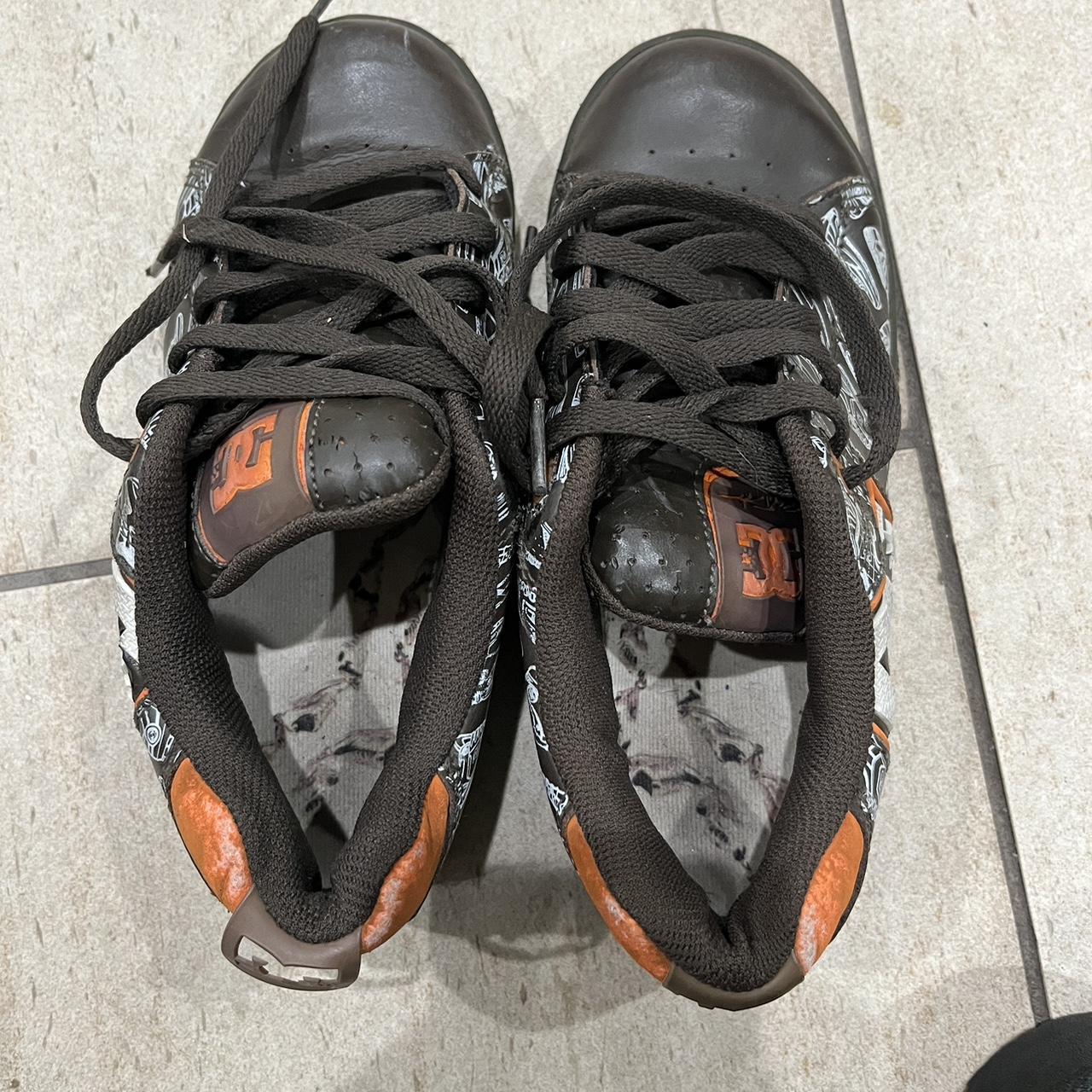 Black and orange DC Shoes sneakers size 4 in kids... - Depop