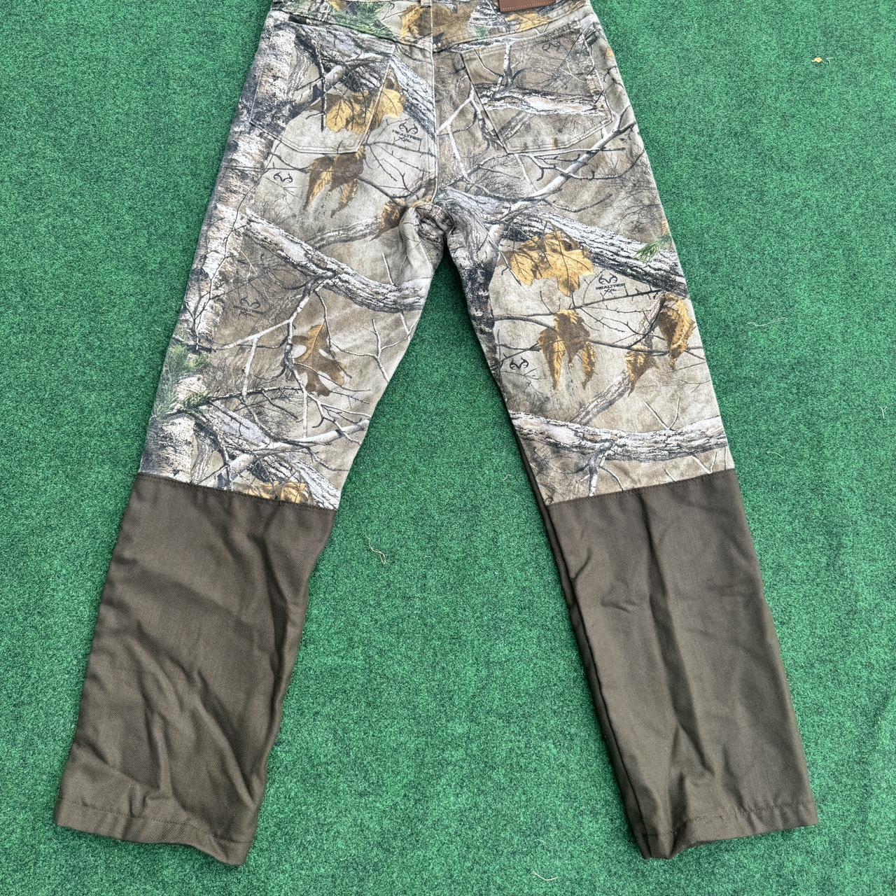 Realtree Wrangler Camo 33x32 pants with a brown knee... - Depop