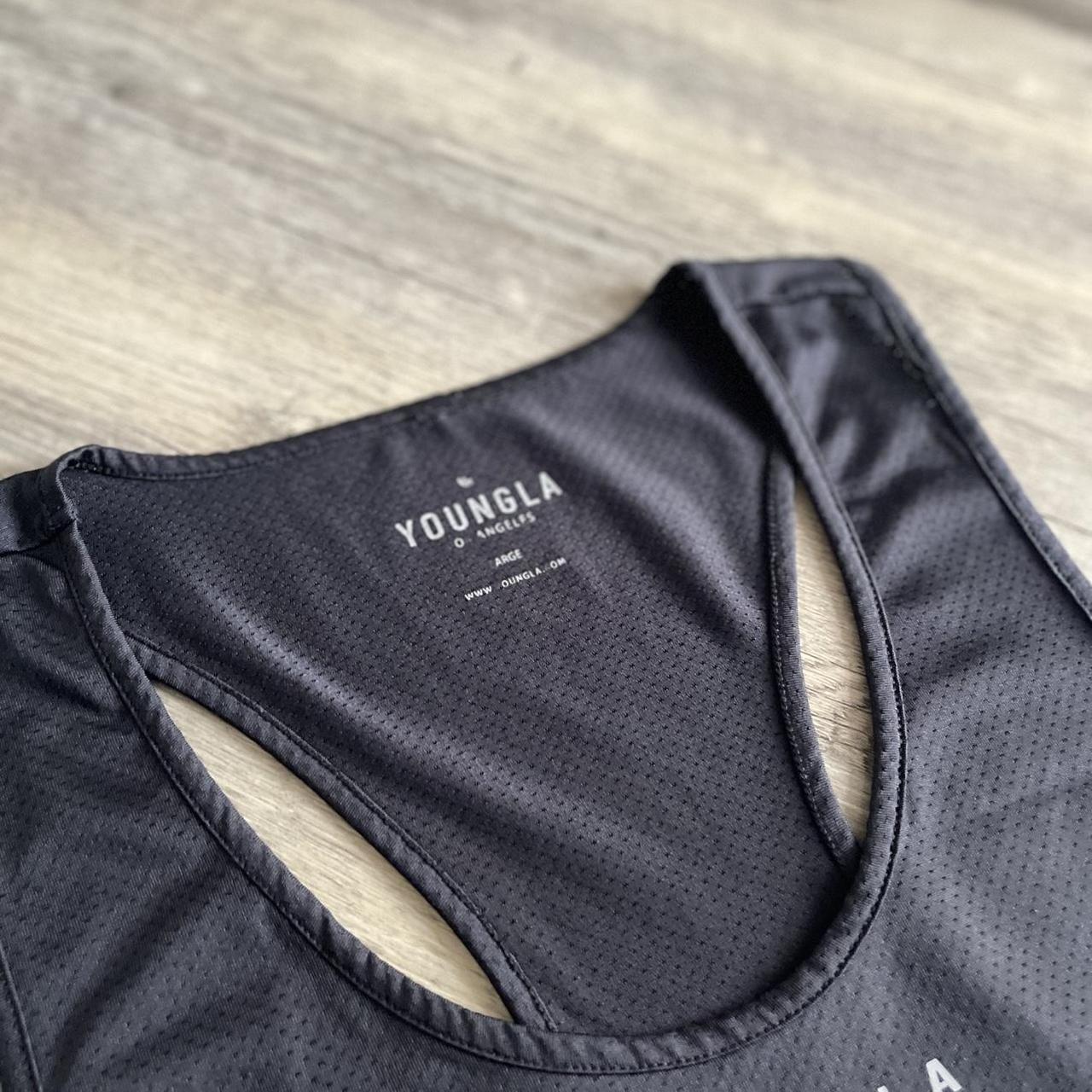 Youngla Black Large Tank/Stringer *Small snag in... | Depop