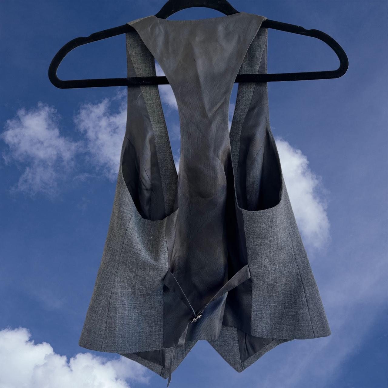 Y2K grey Express vest with adjustable strap in back,... - Depop