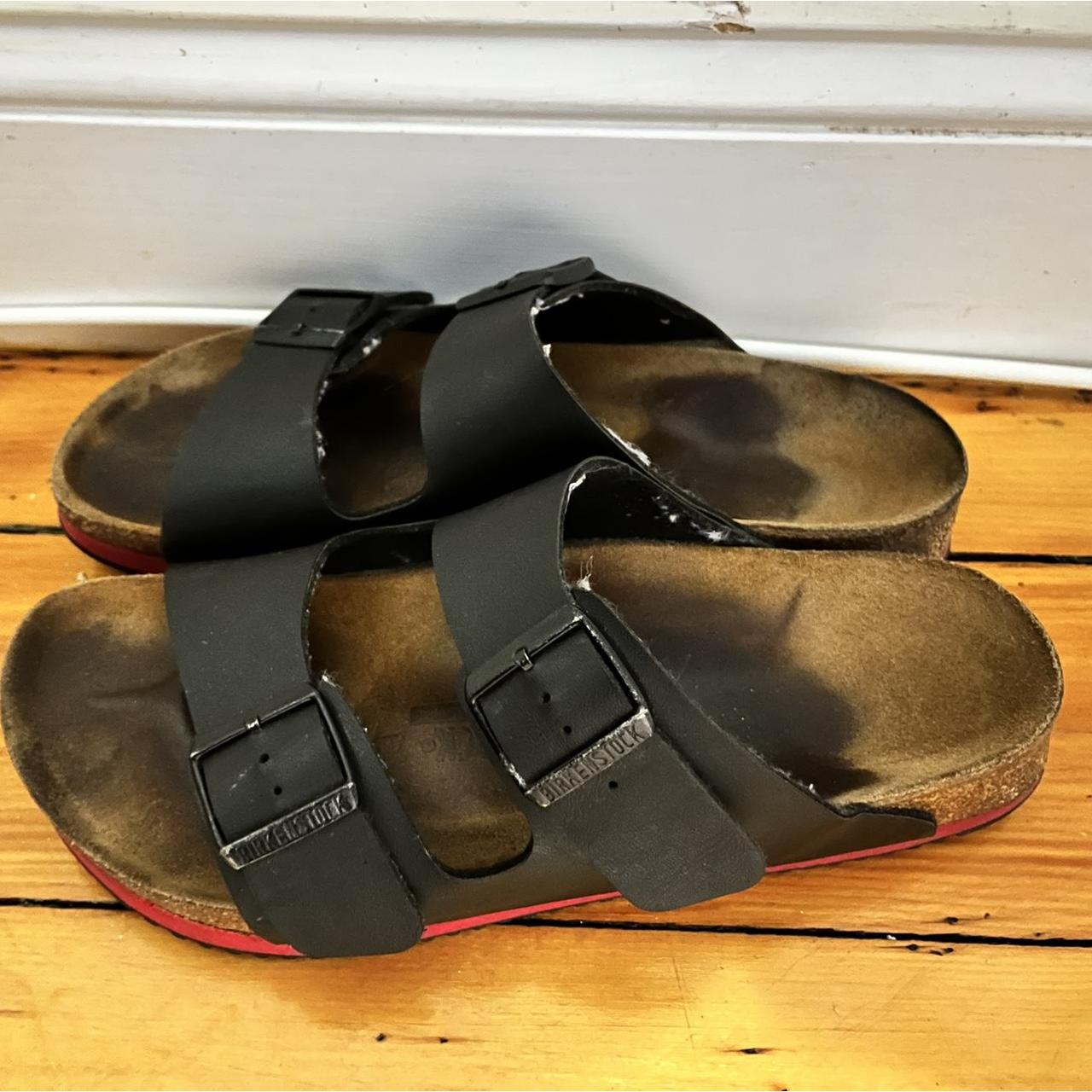 Birkenstocks black with red on bottom - Depop