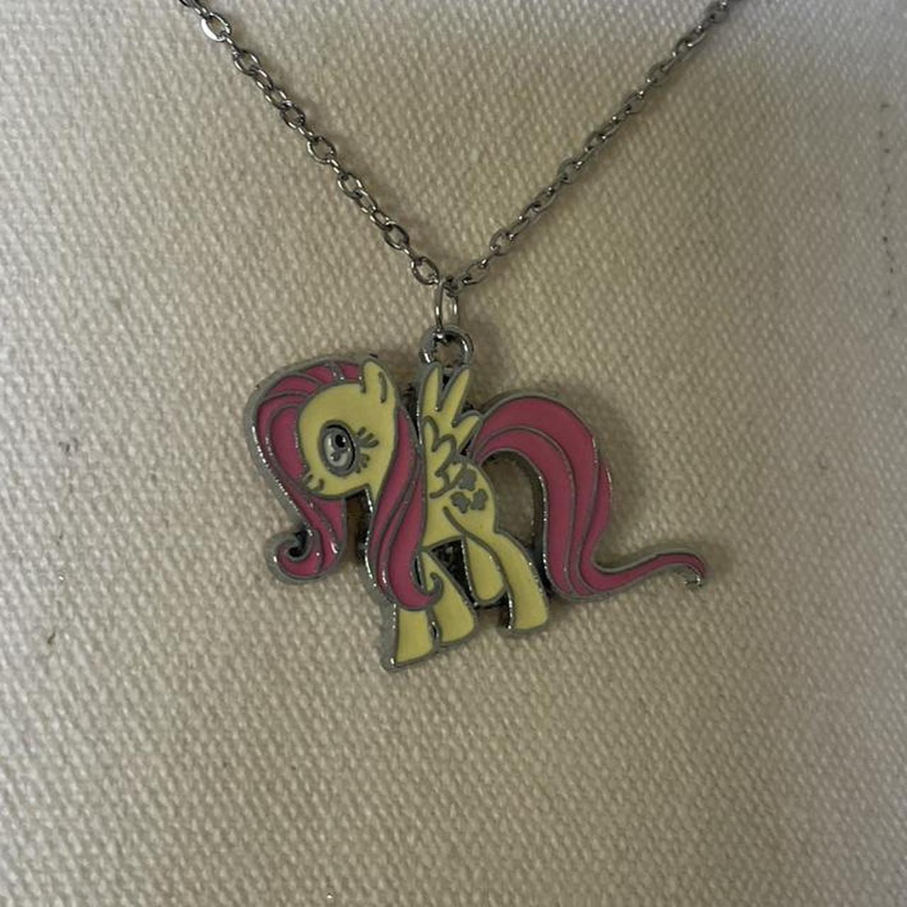 Yellow and purple enamel pony necklace Fluttershy... | Depop
