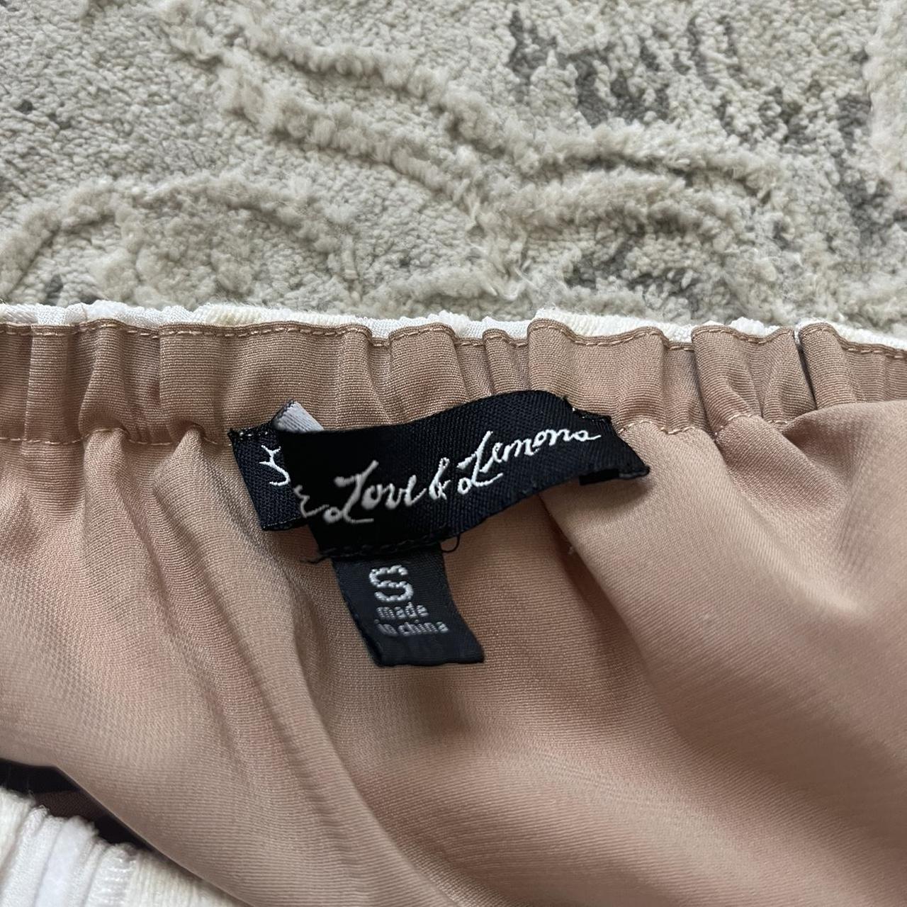 For love and lemons tube top Some of the Pom poms... - Depop