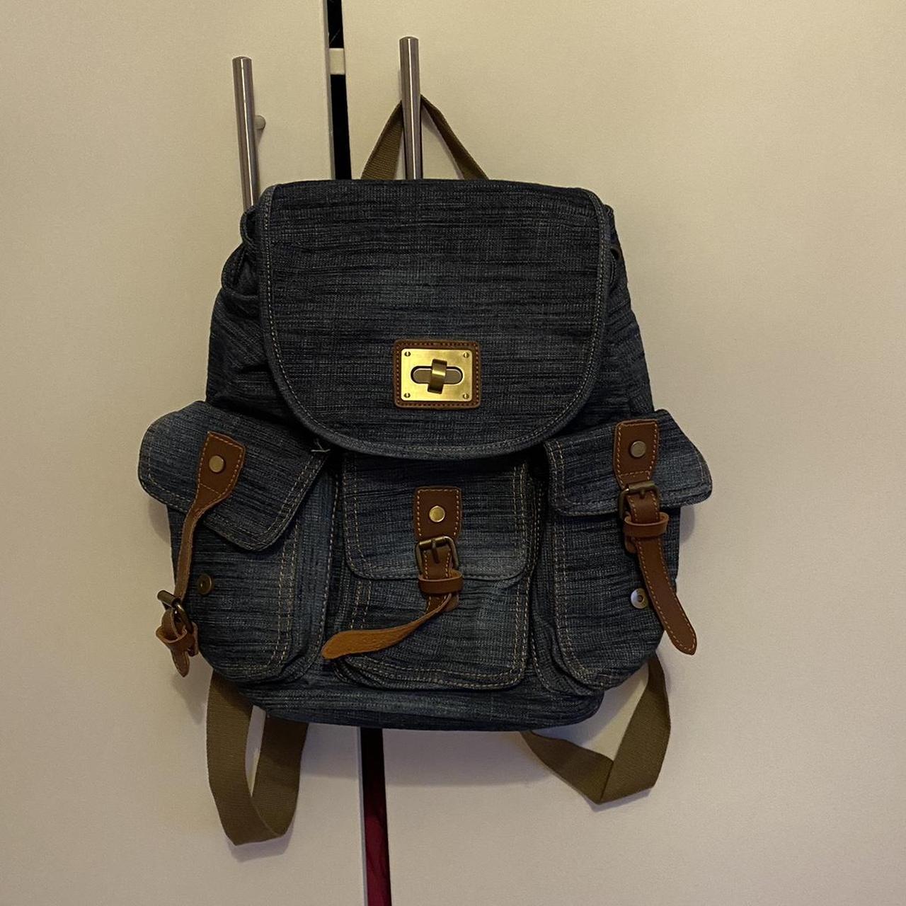 - spacious denim blue backpack with brown suede... - Depop