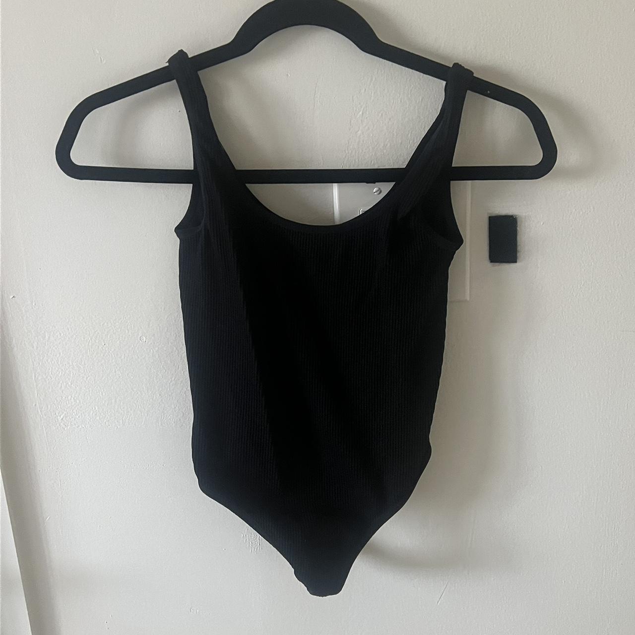 Ribbed black bodysuit. Size small, in great condition. - Depop
