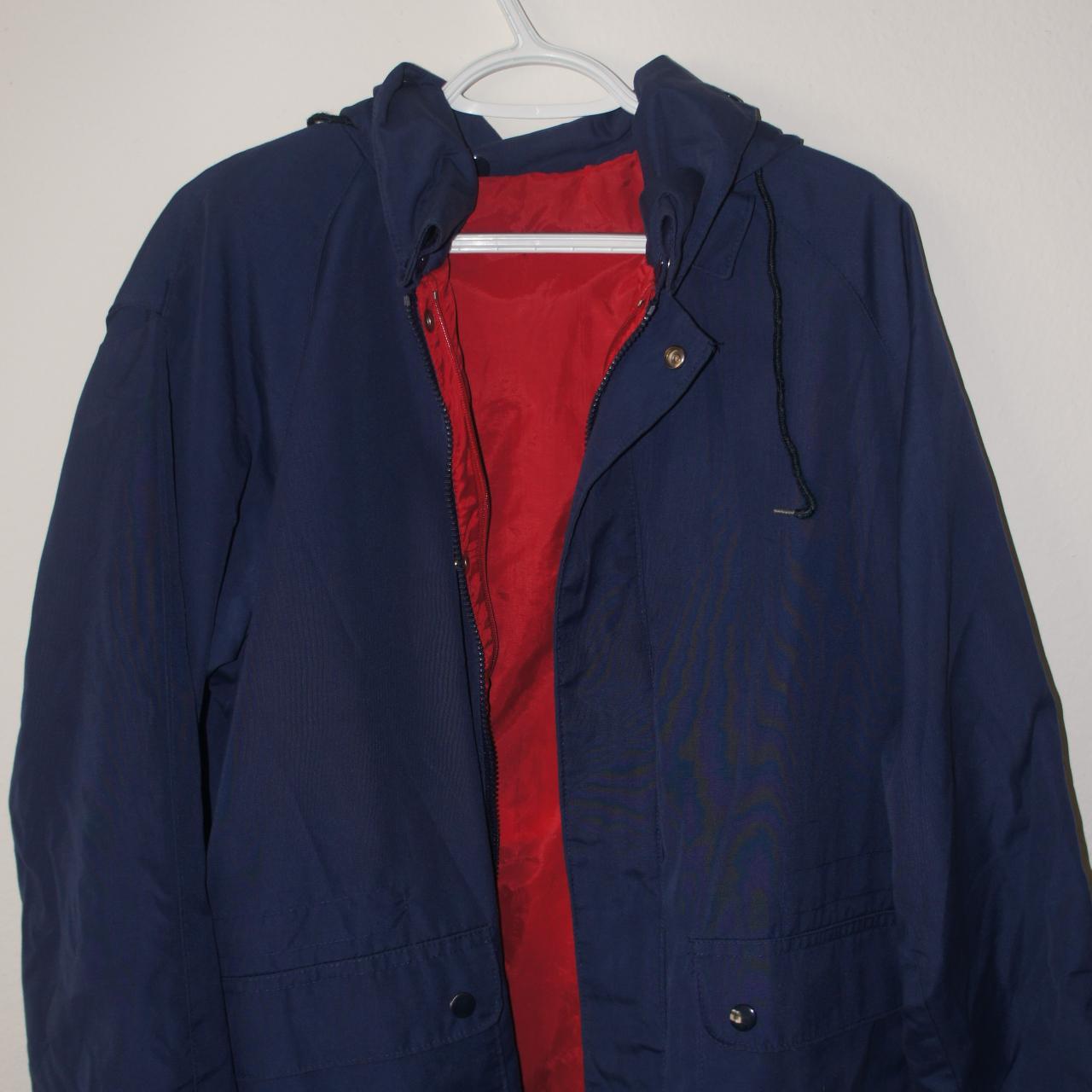 Blue Raincoat with Red lining. Hidable hood, with... - Depop