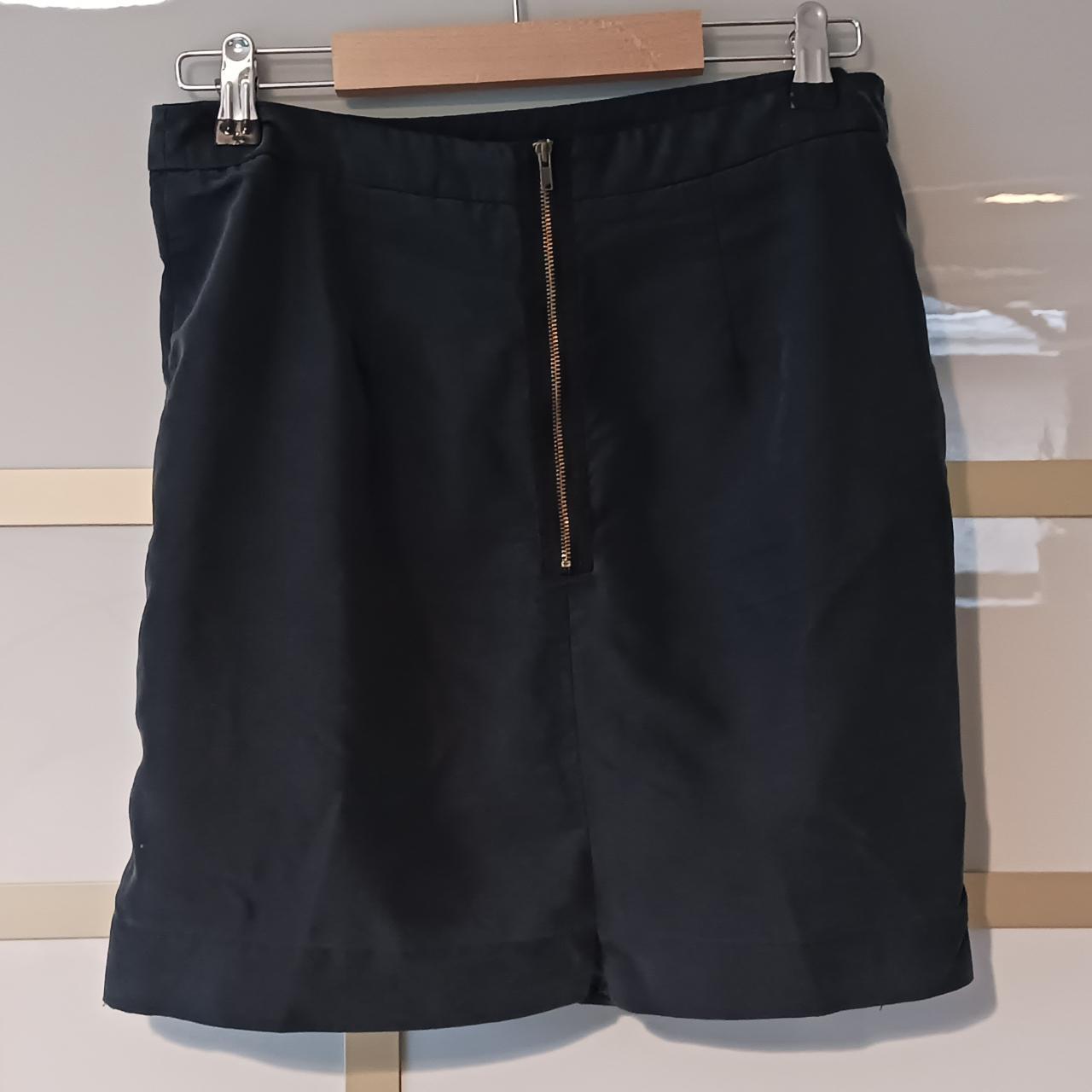 Black Front Ruffle Skirt, slight rip in back seam,... - Depop