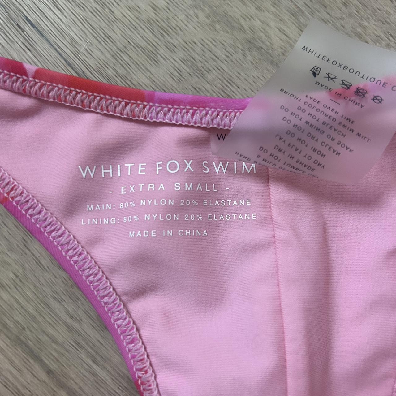 Cutest white fox swimsuit!! Has one snag other than... - Depop