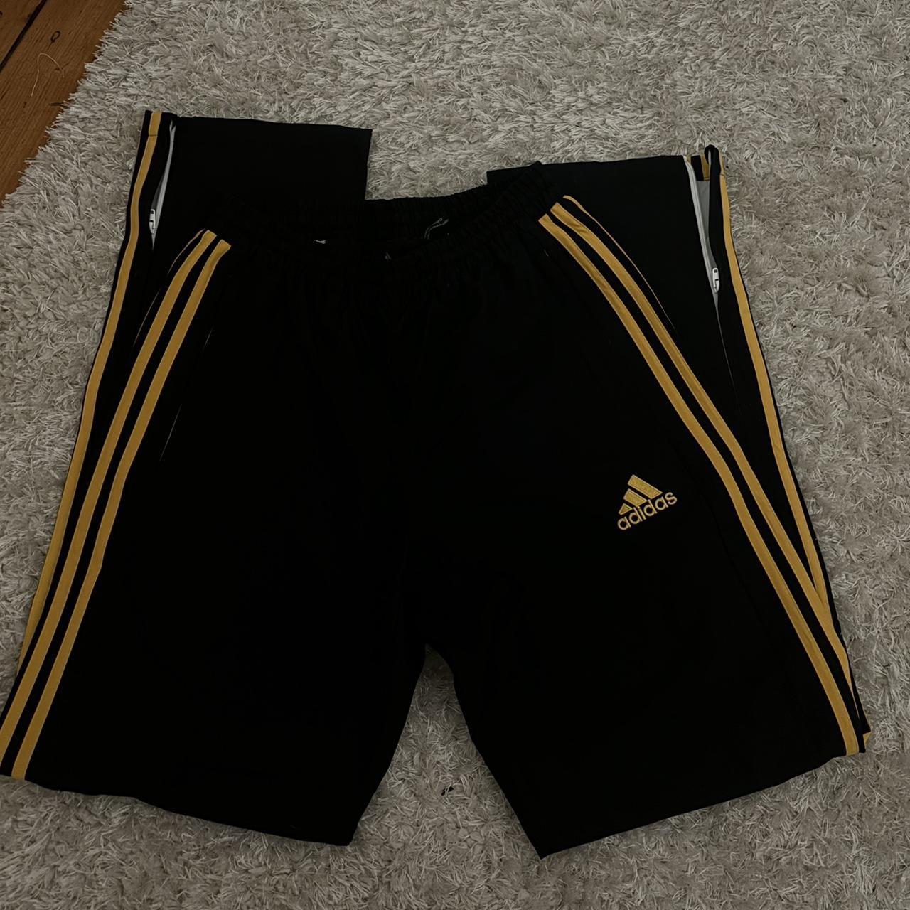 sickest black and yellow adidas straight leg spray... - Depop