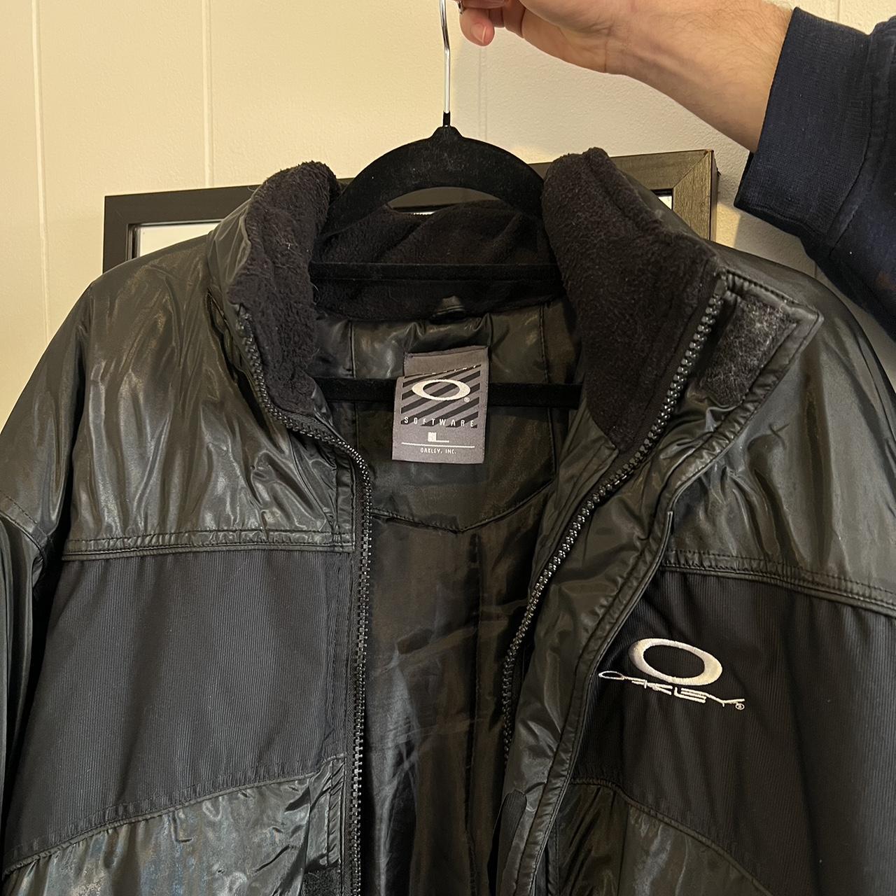 super heavy vintage oakley jacket darker black in... - Depop