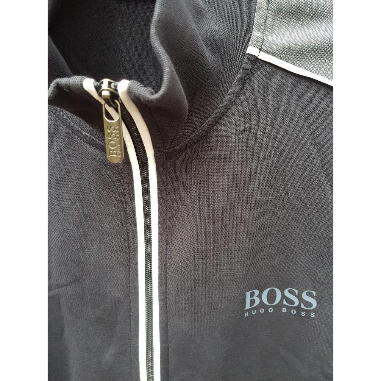 Gorgeous boss track jacket good condition some loose... - Depop