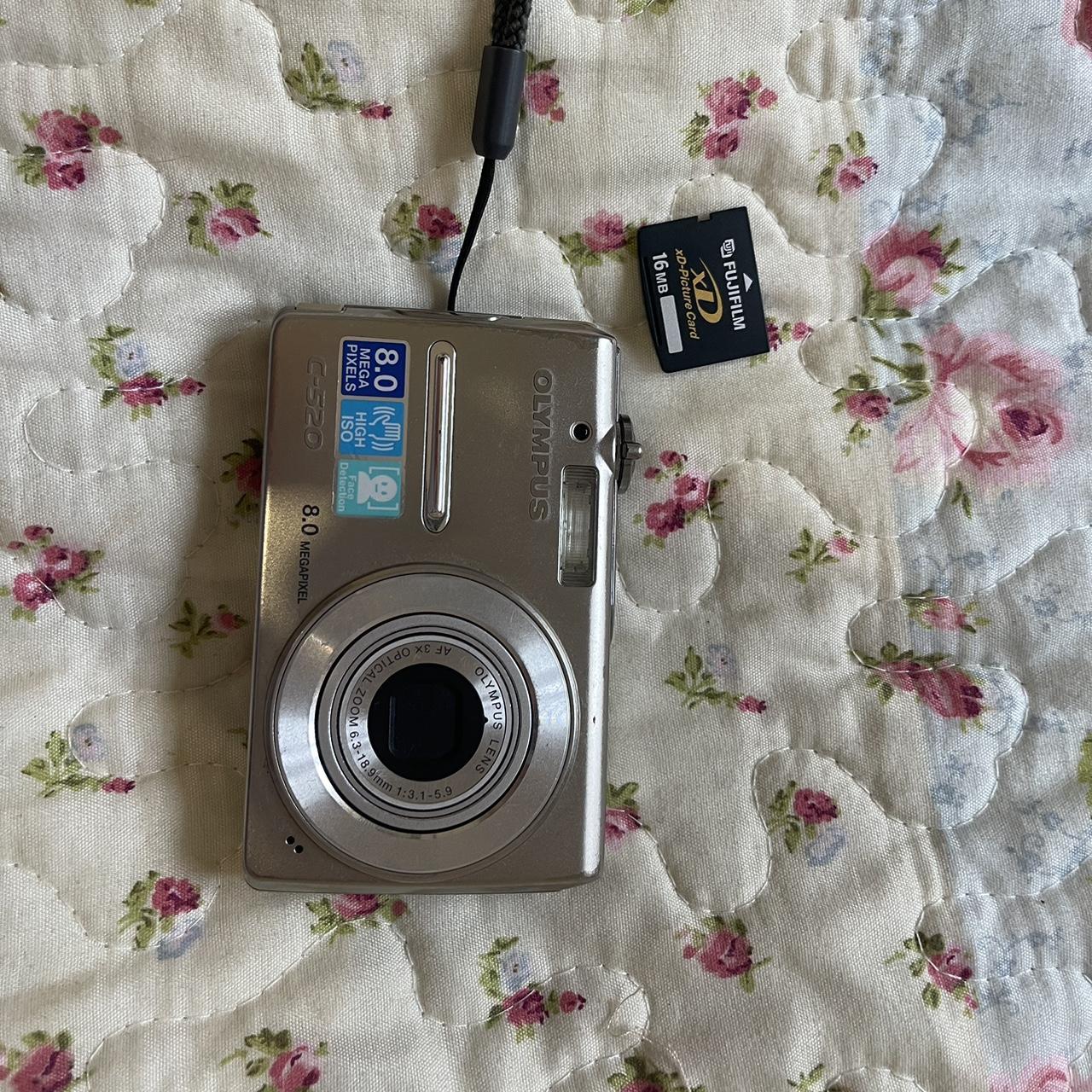 Working digital camera with empty xd card and battery - Depop