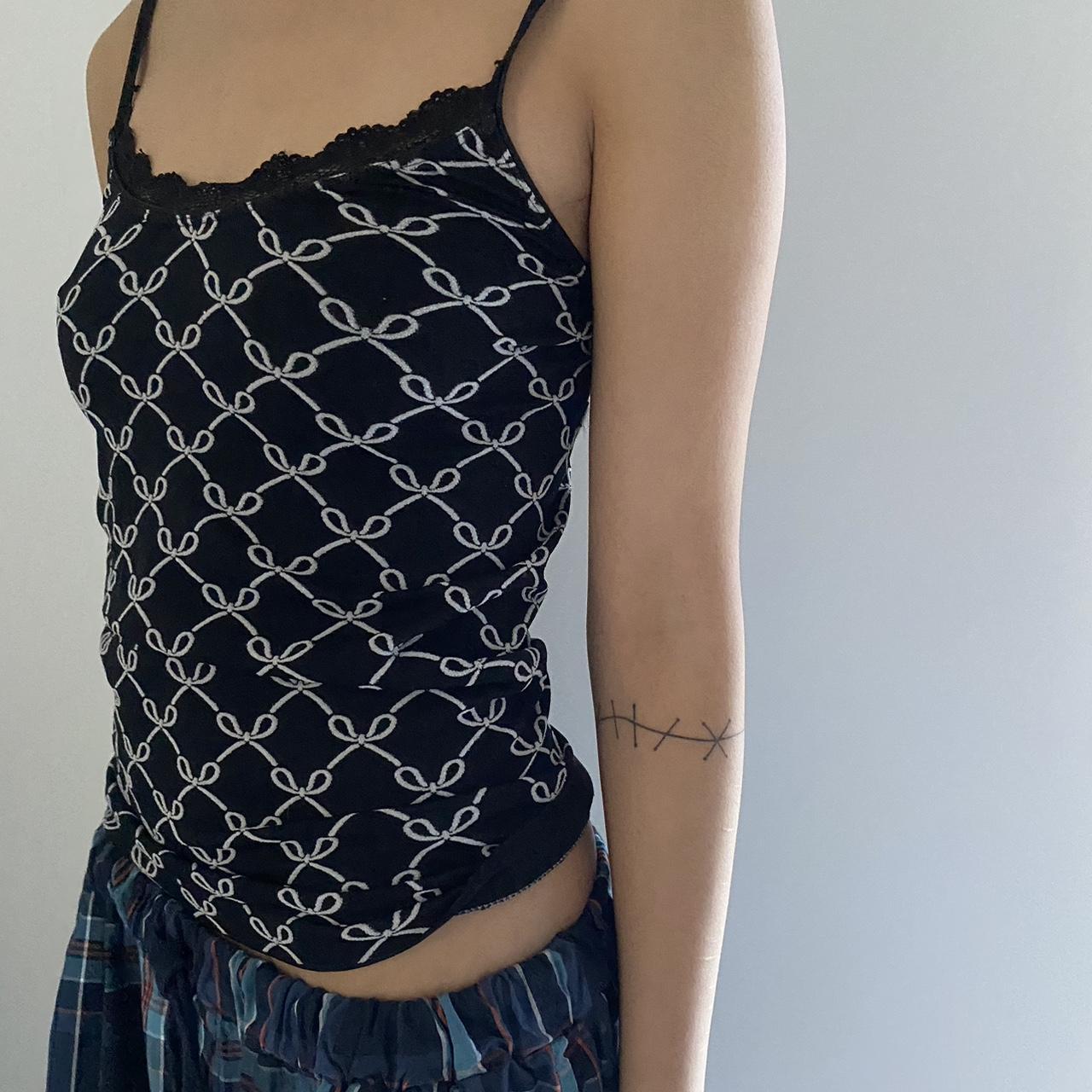 Cute bow singlet with lace neckline super comfy and... - Depop