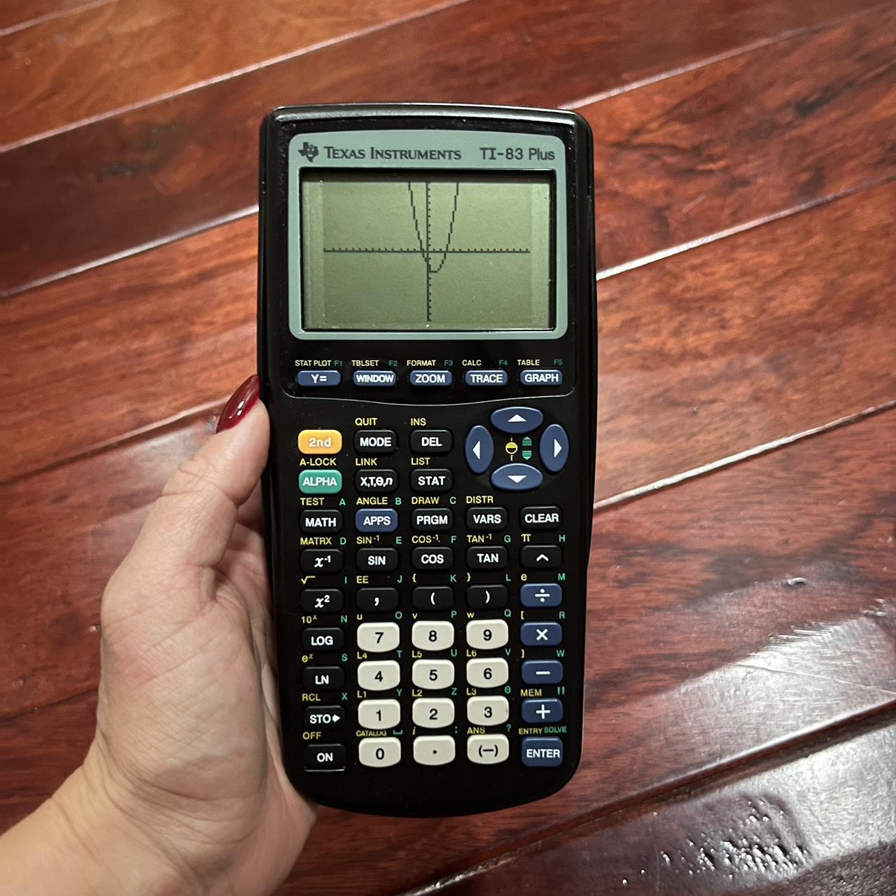 Black Texas Instruments TI-83 Plus calculator... | Depop