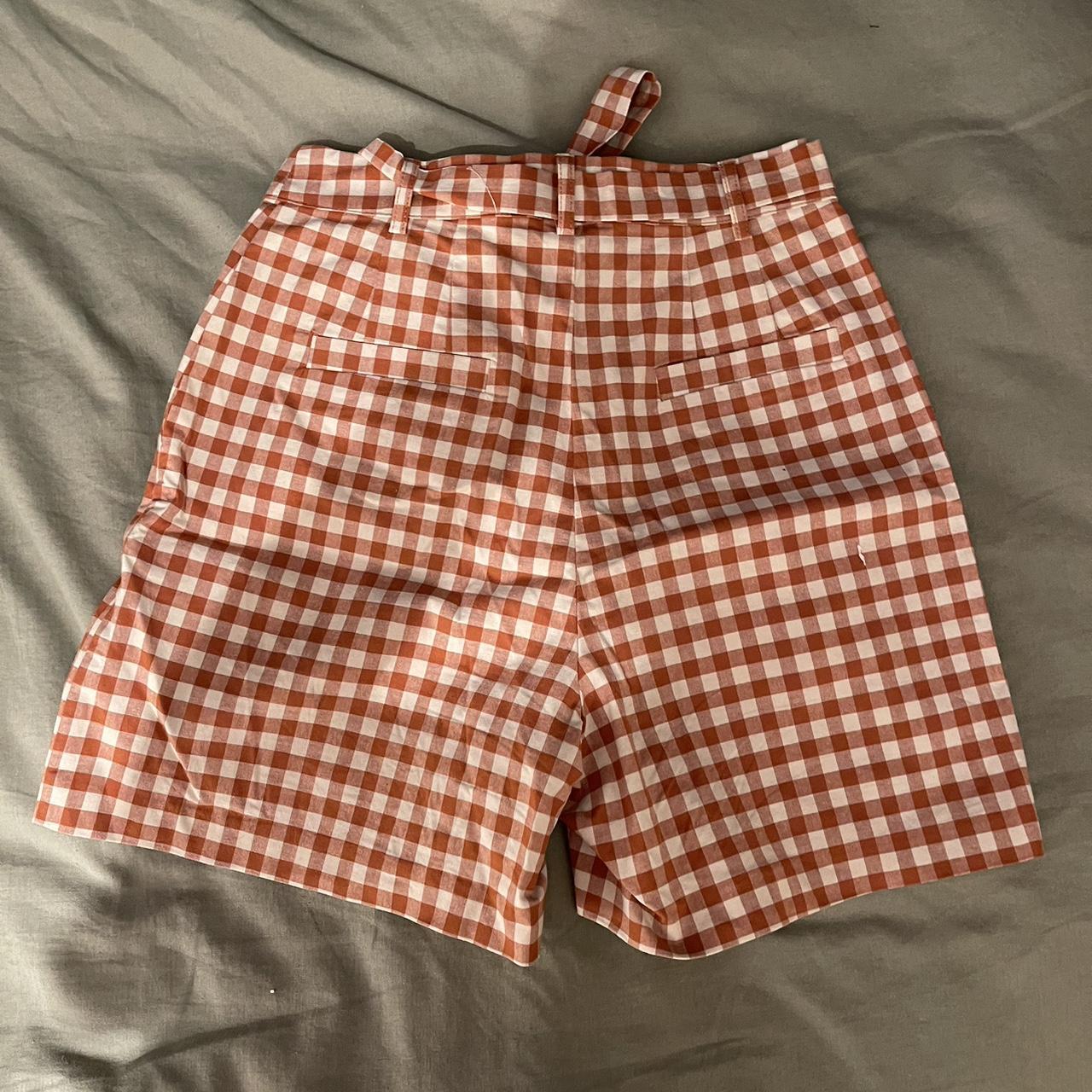 Orange and white checkered shorts with tie waist... - Depop