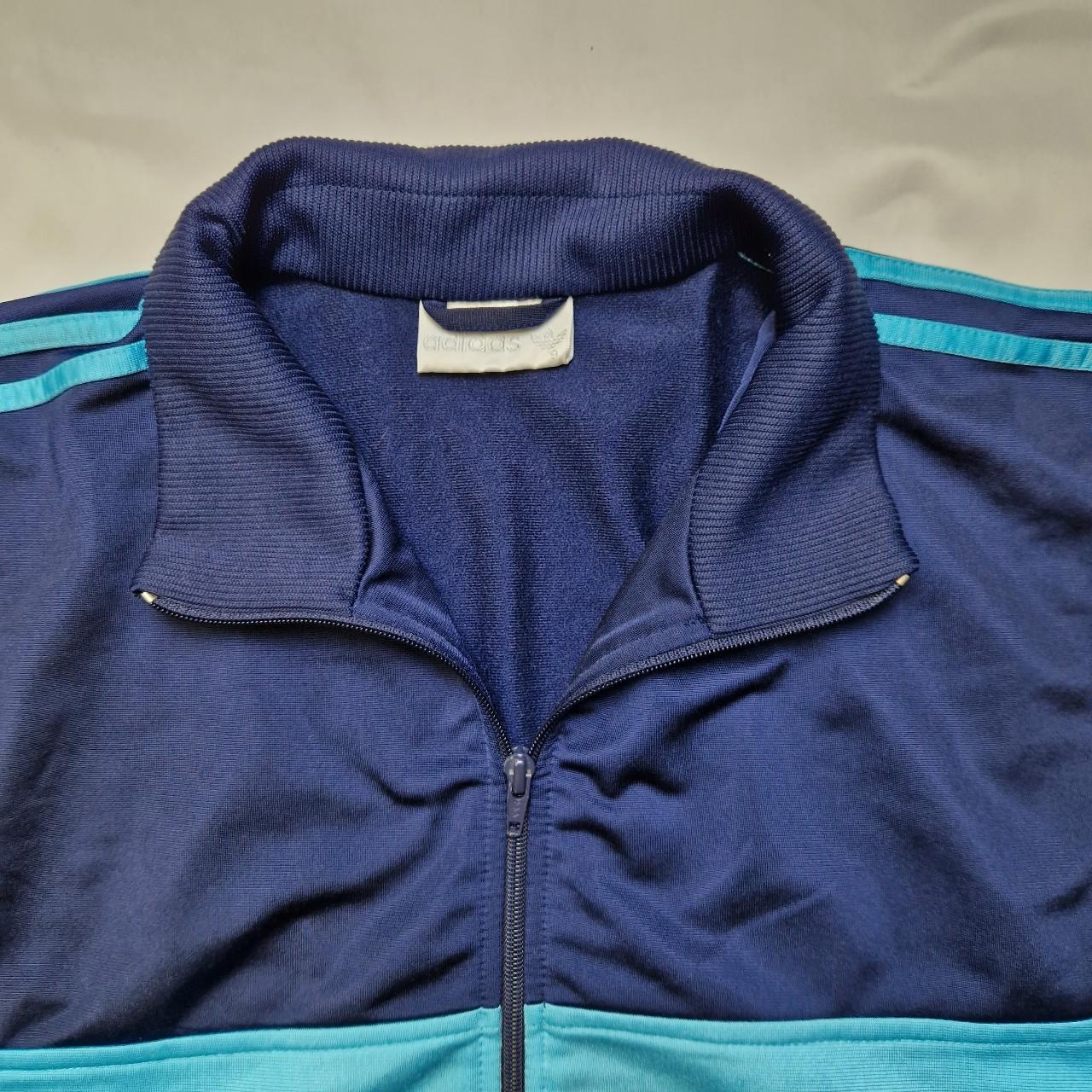 Vintage Adidas track jacket in light blue and navy... - Depop