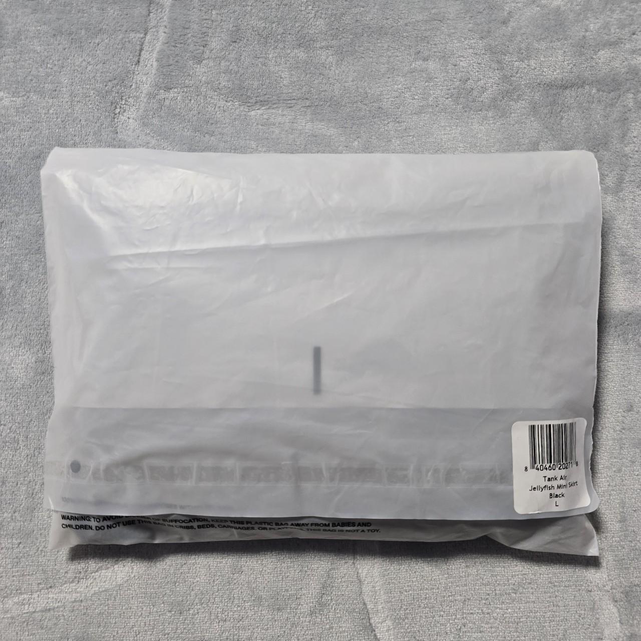 tank air studio jellyfish mini skirt in black size... | Depop