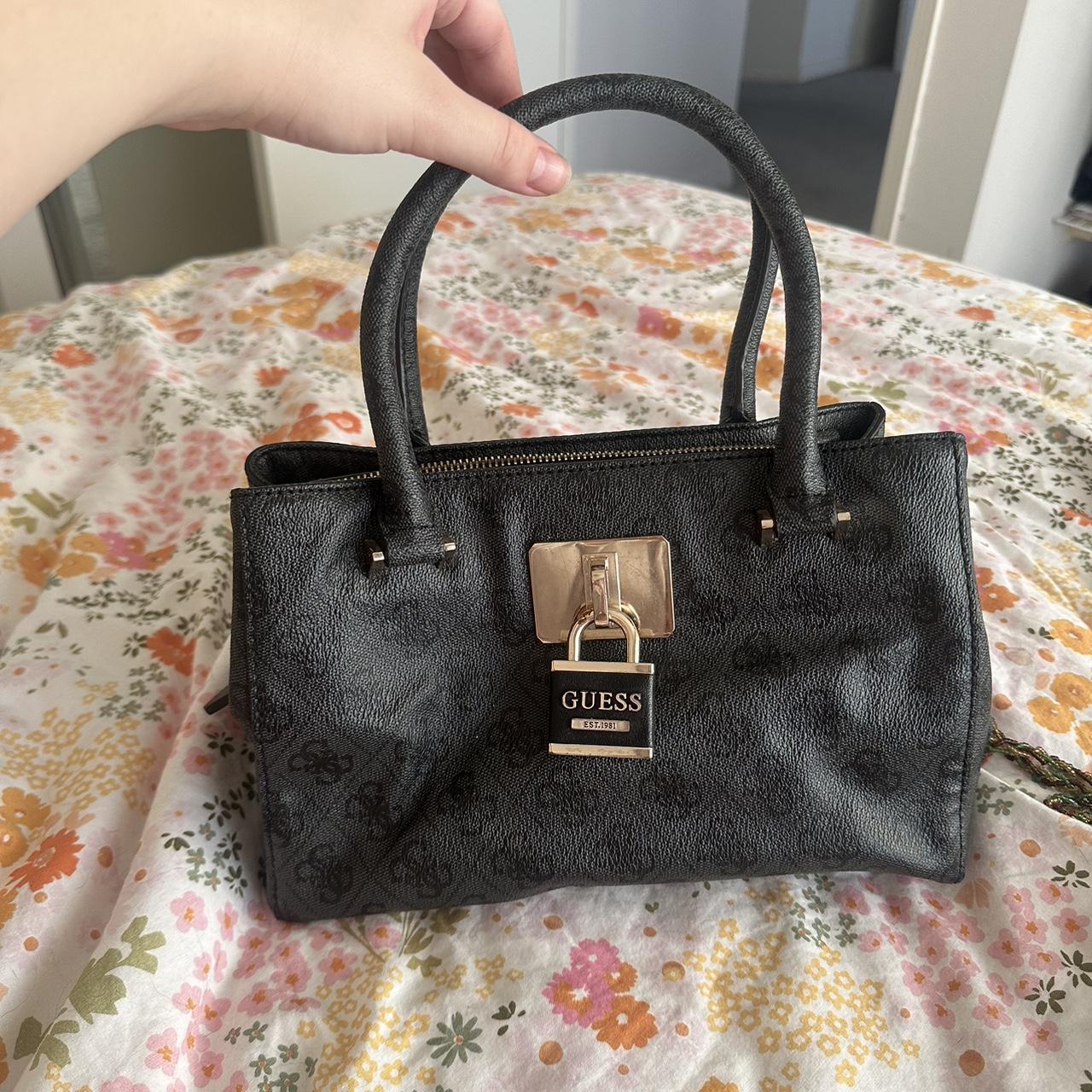 Guess hand bag • slight rust damage to the lock as... - Depop