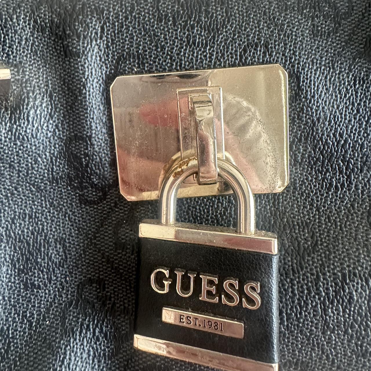 Guess hand bag • slight rust damage to the lock as... - Depop