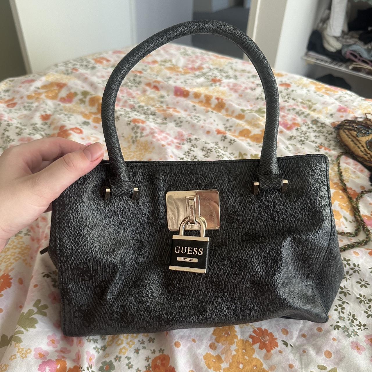 Guess hand bag • slight rust damage to the lock as... - Depop