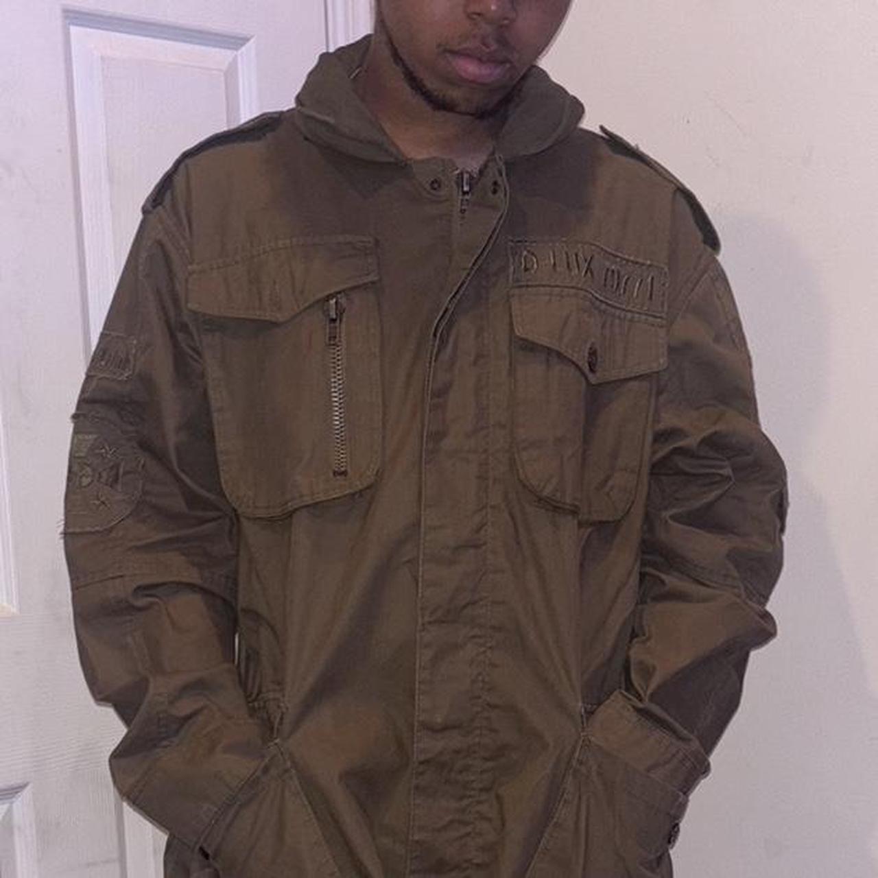 Military Surplus Jacket with patches on the sleeve... - Depop