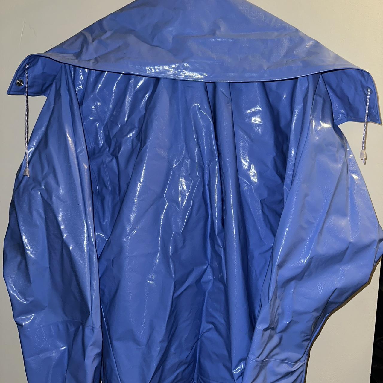 Blue raincoat with a unique, oversized fit One size... | Depop