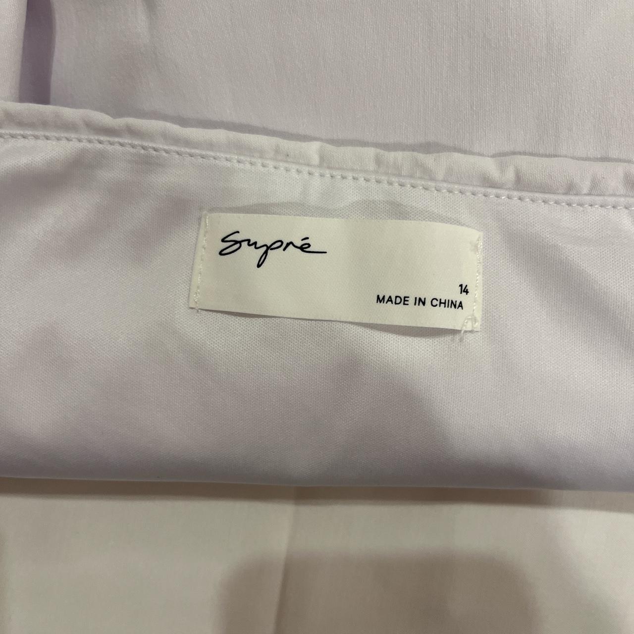 White mini skirt from supre Split front style... - Depop