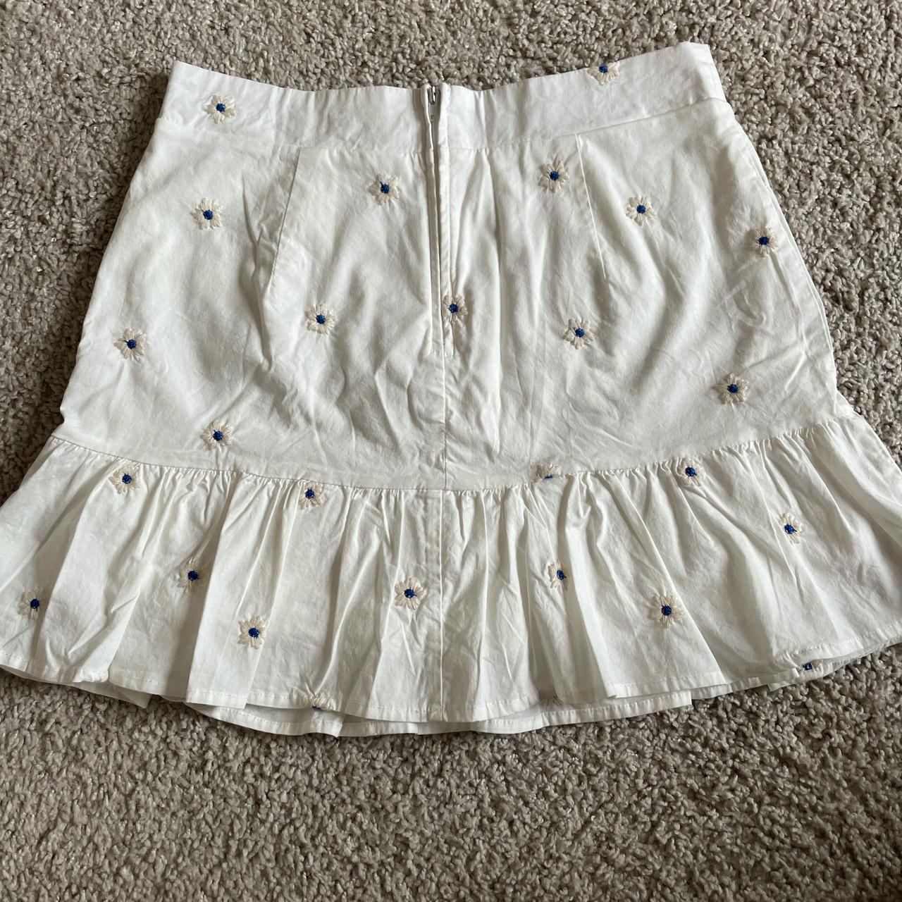 white ruffle skirt with navy flowers - altar’d... - Depop