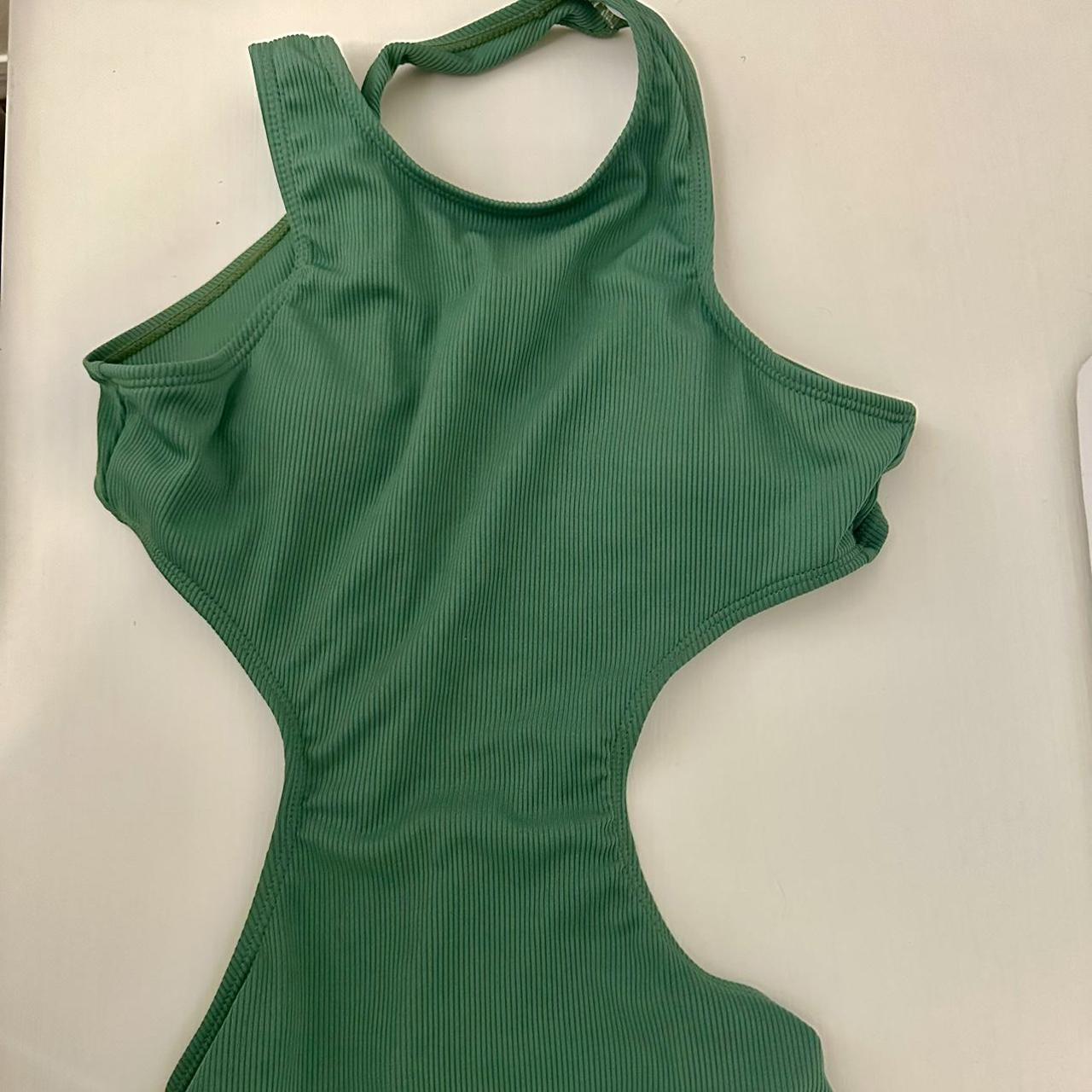 green one piece cross back straps and ruffled bottom... - Depop