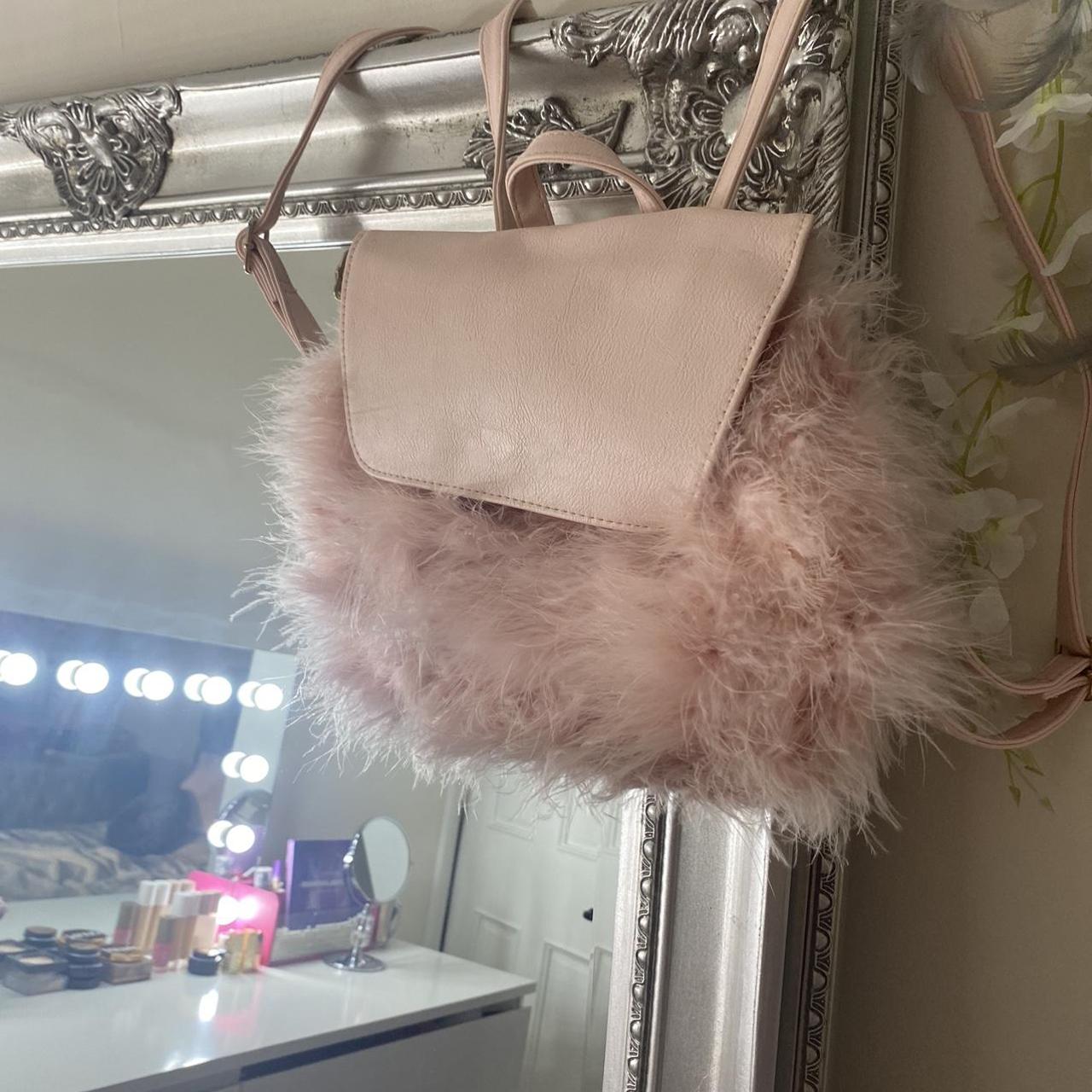 Pink Fluffy backpack - Depop