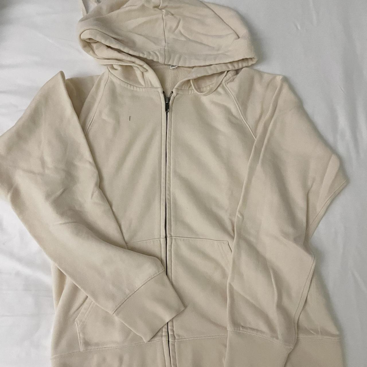Uniqlo cream zip up Size M - runs small Would fit... - Depop