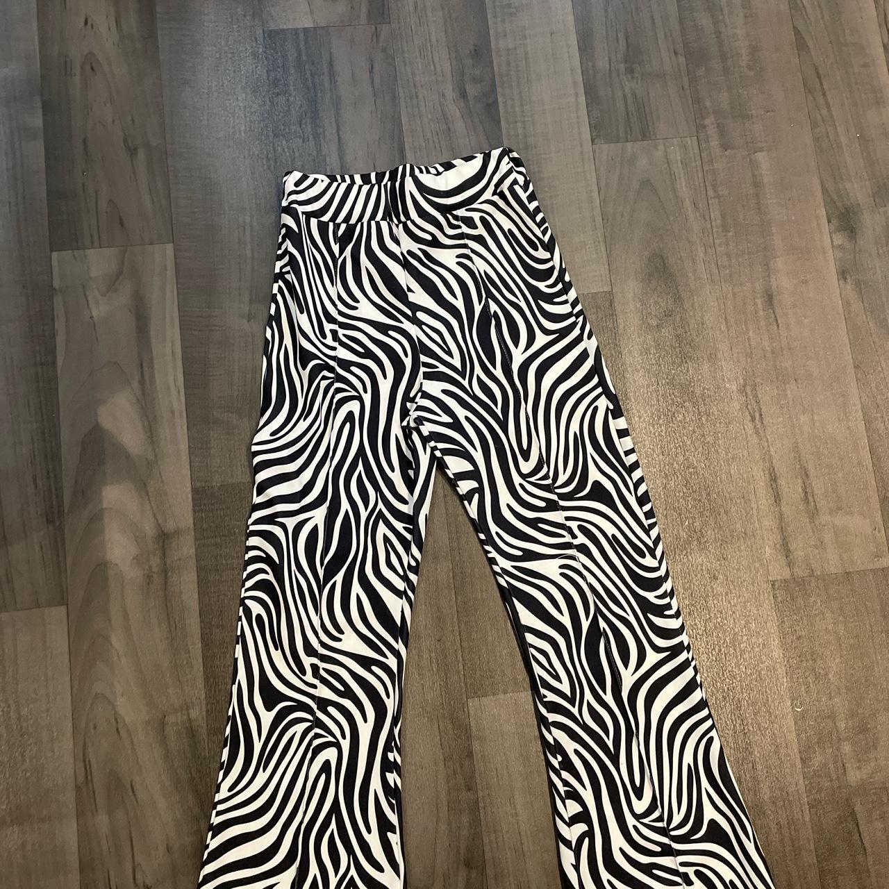 Flared zebra flares Never worn Perfect condition... - Depop