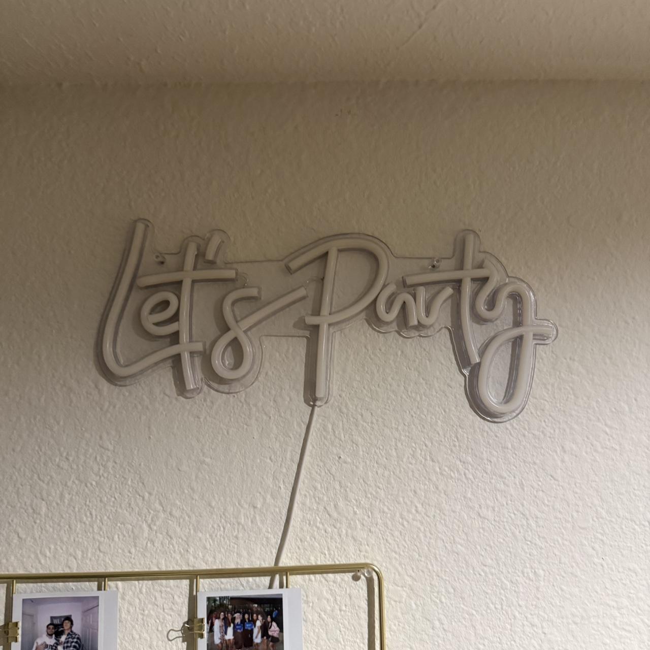 Neon pink "Let's Party" LED sign with controls on... | Depop