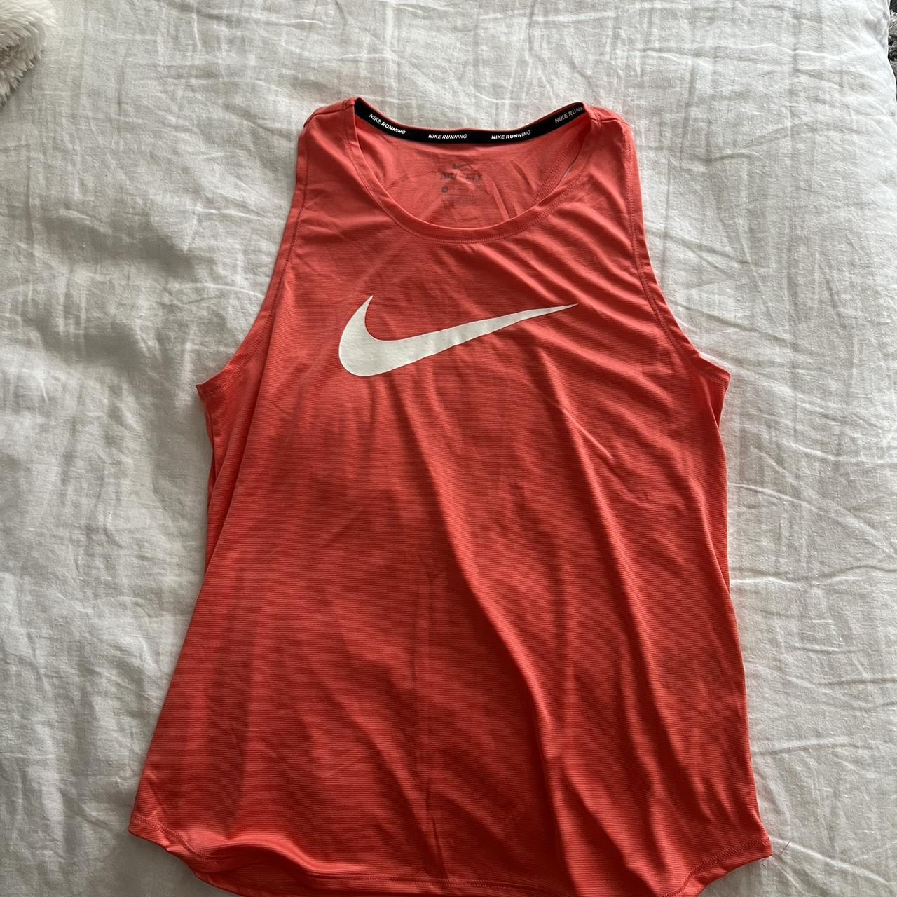 reddish-orange, nike running tank top, size medium - Depop