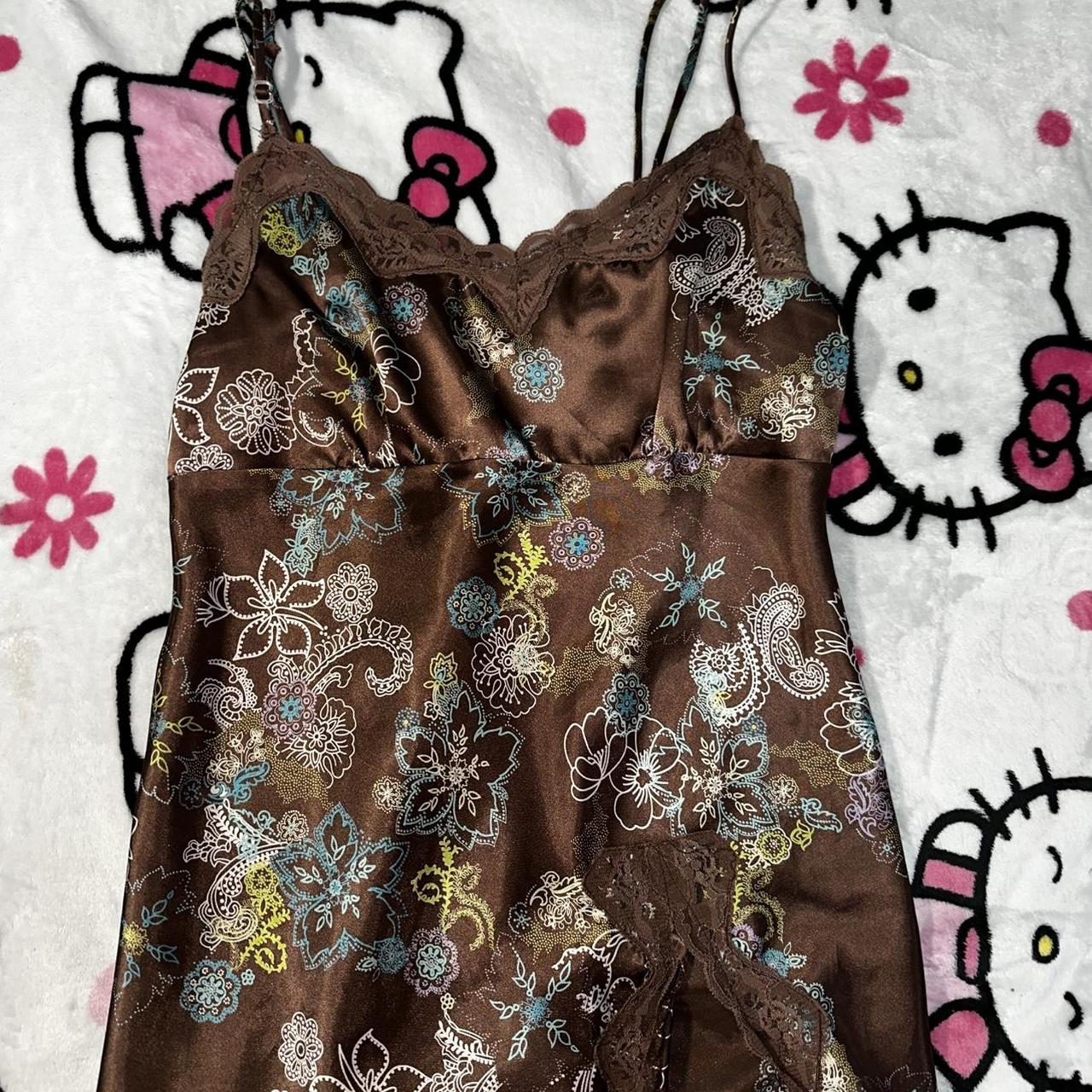 Brown floral lace cami with adjustable straps and... - Depop