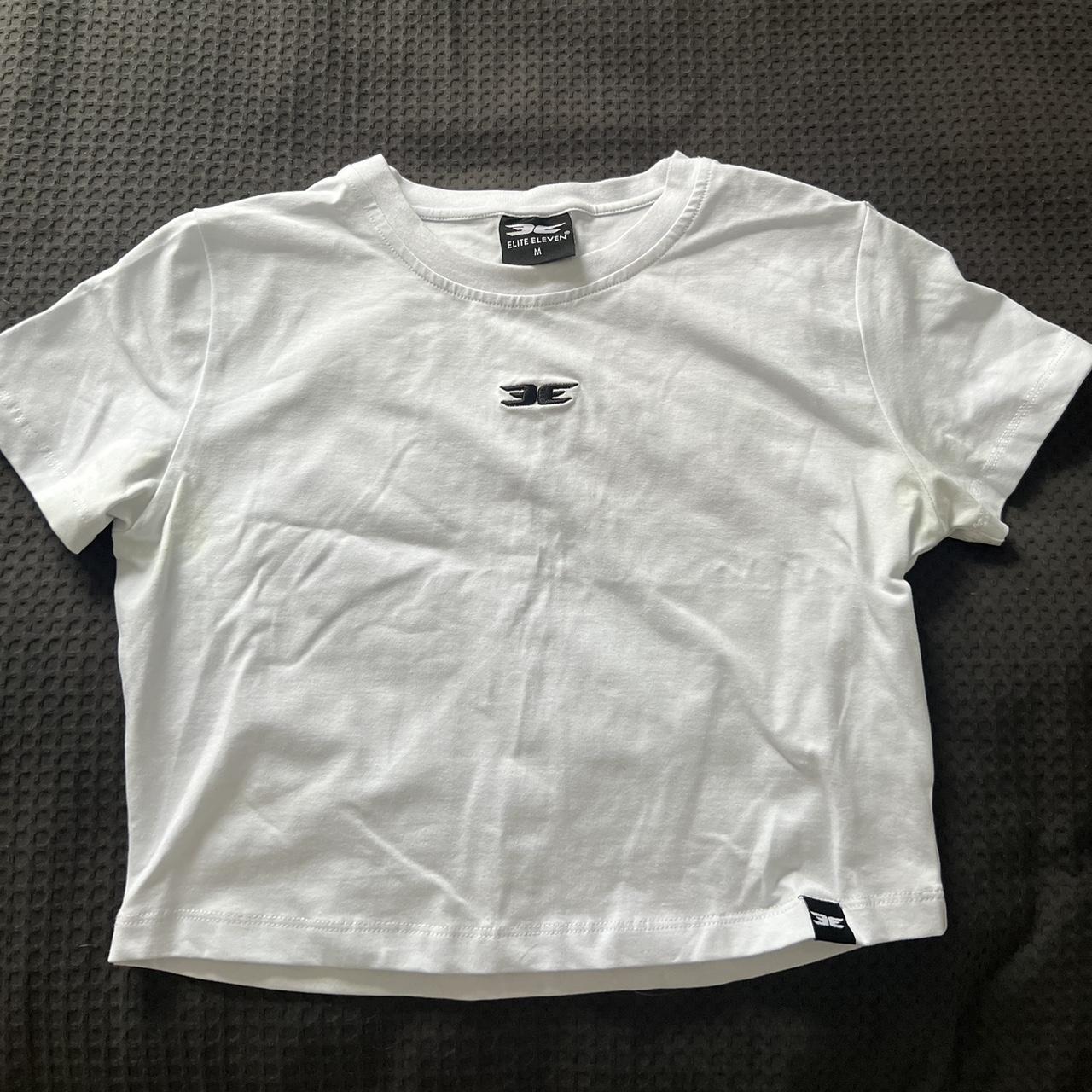 elite eleven white crop tshirt worn once, fits a... - Depop