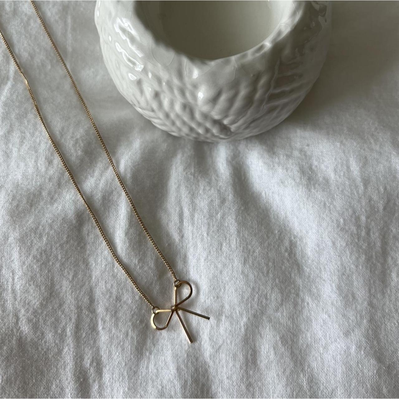 gold ribbon necklace perfect for layering vintage... - Depop