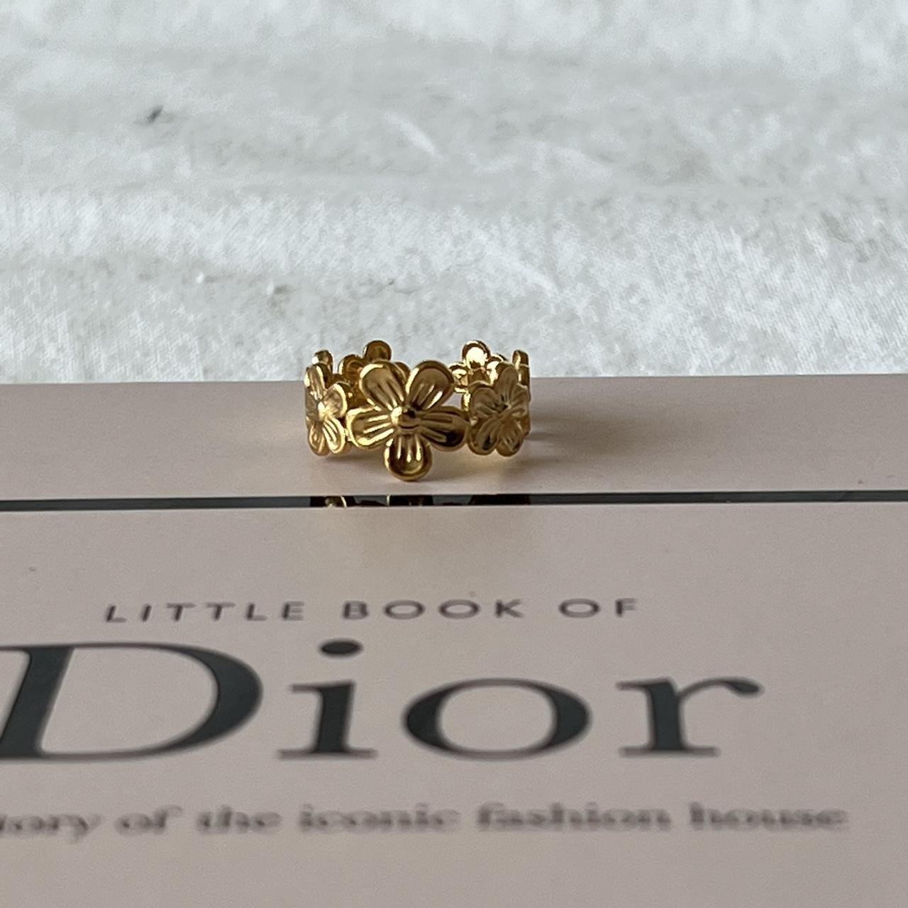 gold flower ring size: adjustable gold plated... - Depop