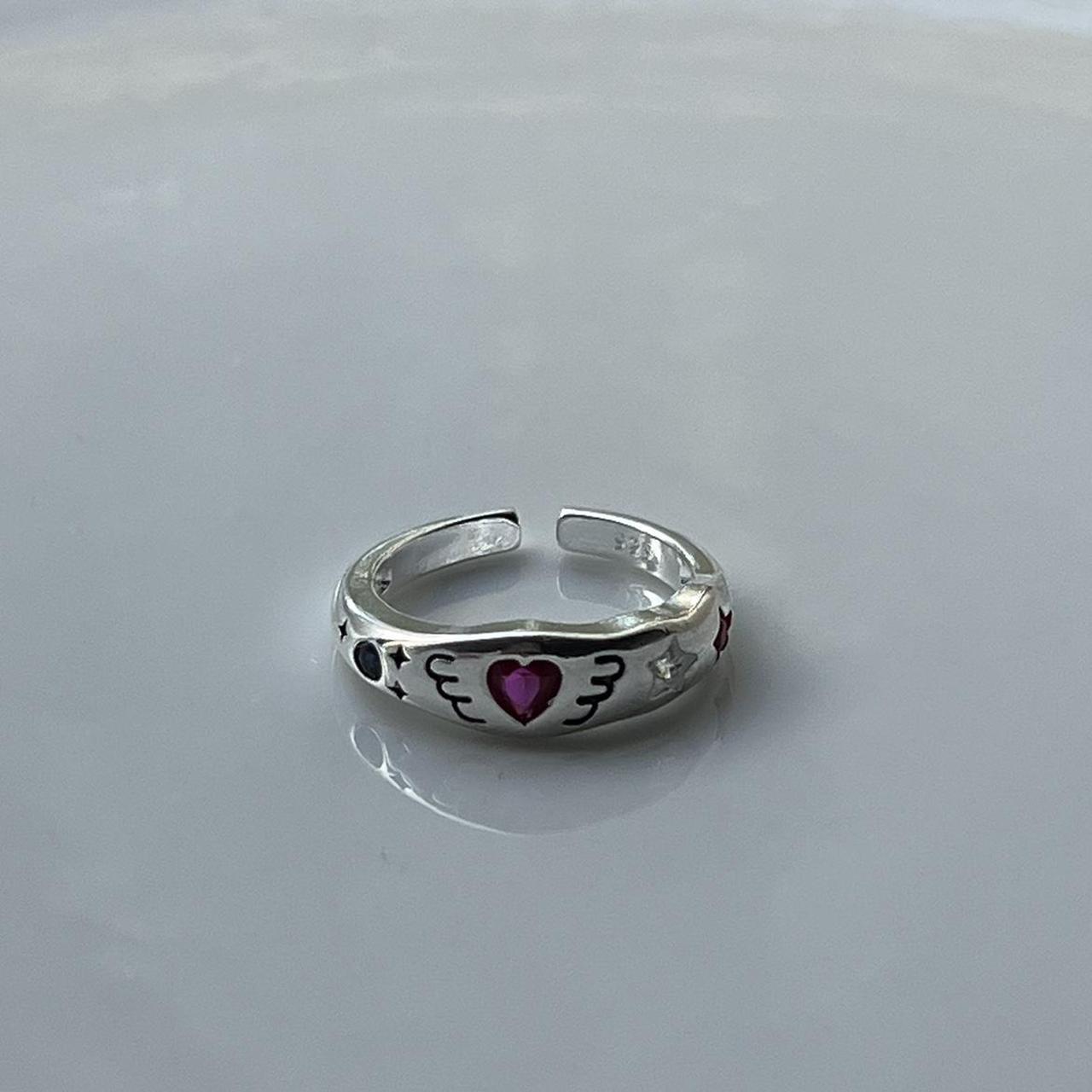 silver chunky ring with pink, red, and purple... - Depop