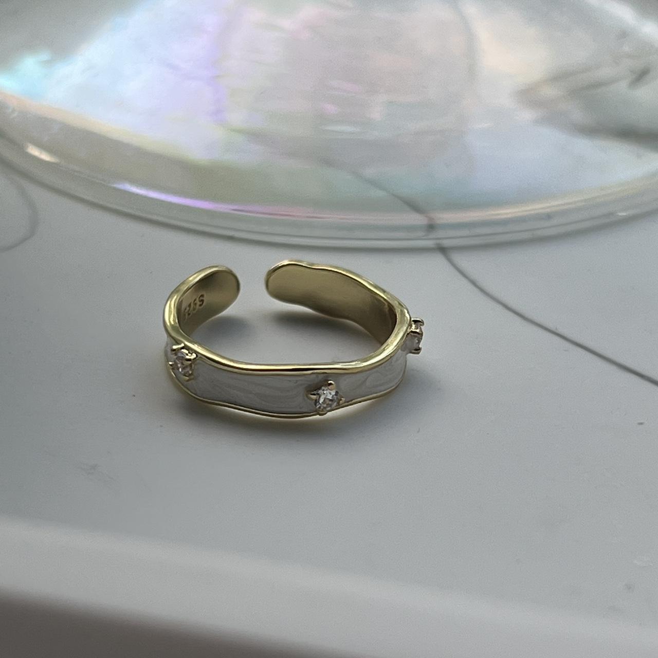 gold white marble ring with star accents size :... - Depop