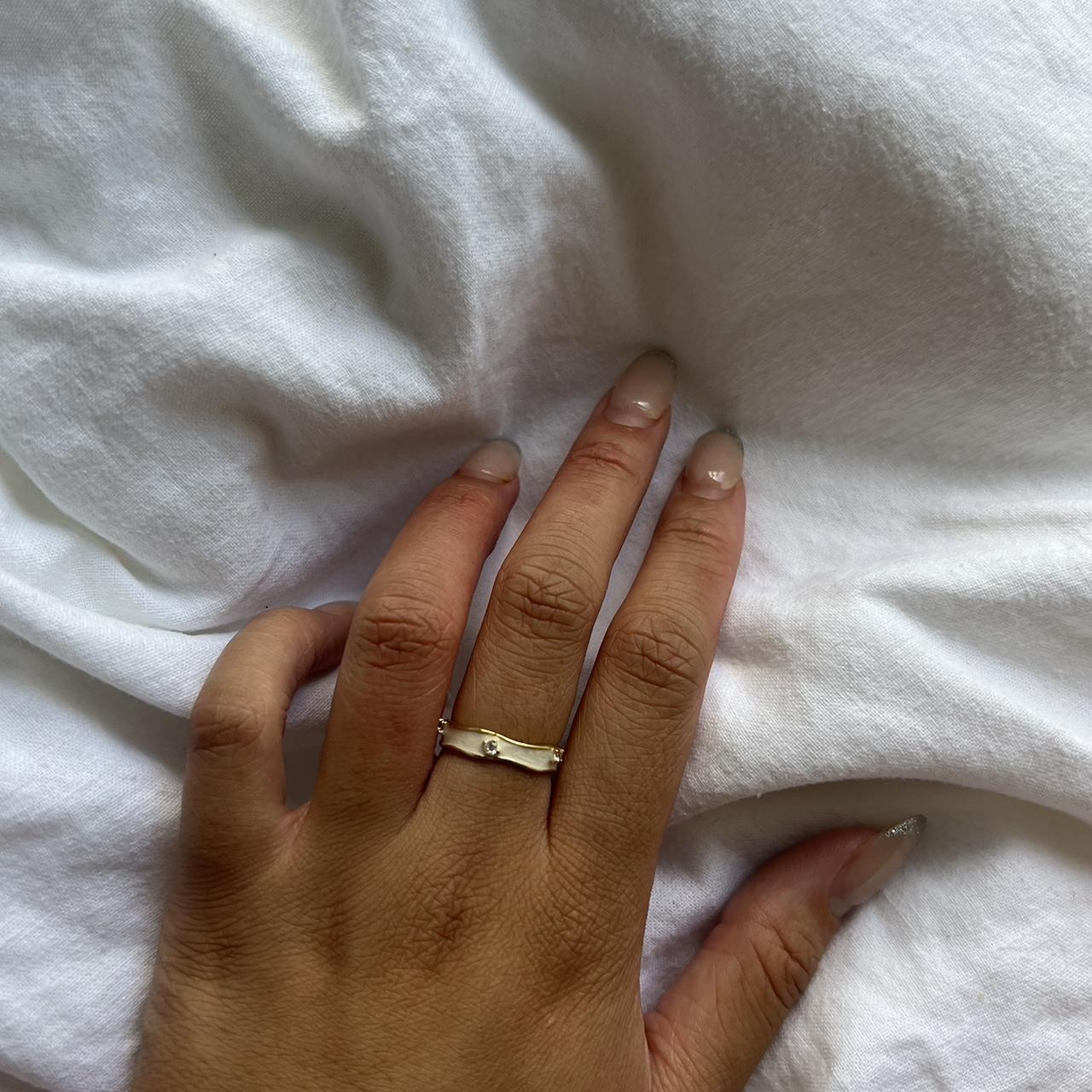 gold white marble ring with star accents size :... - Depop