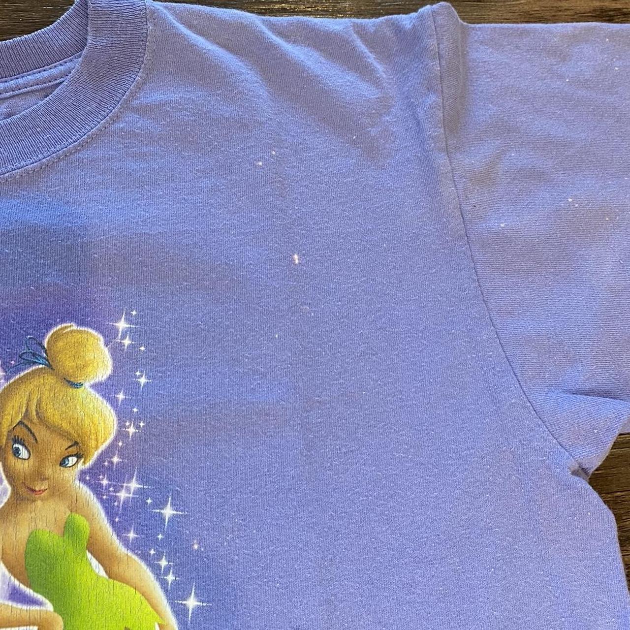 The Disney Store Lilac/Blue Tinker Bell Graphic... - Depop