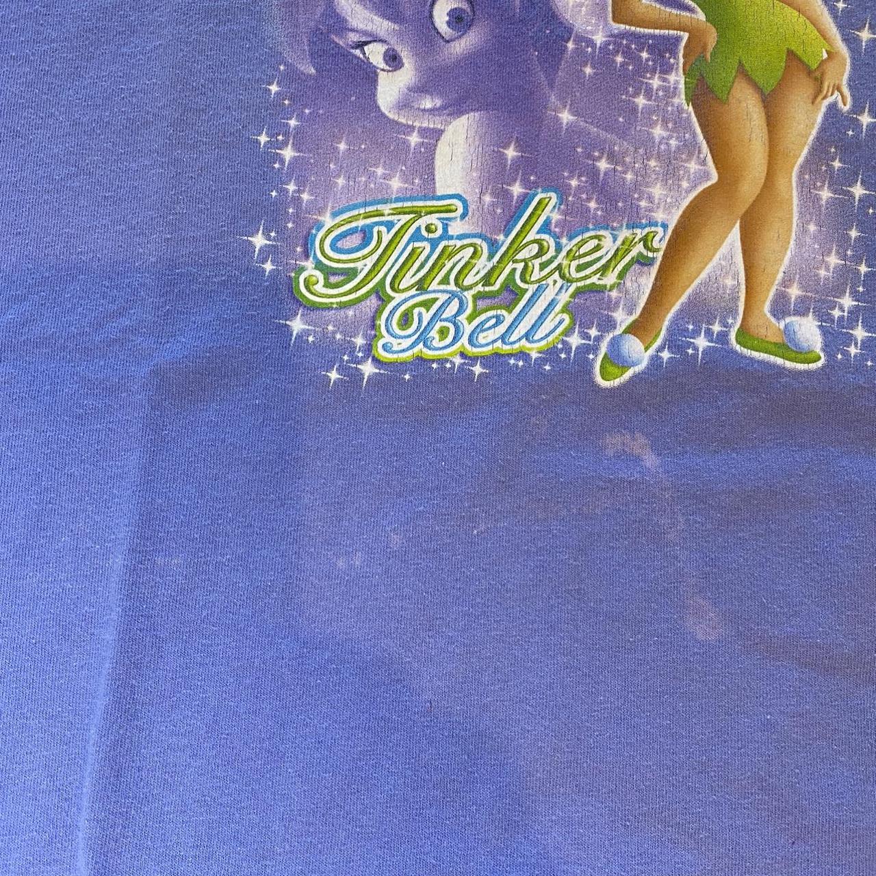 The Disney Store Lilac/Blue Tinker Bell Graphic... - Depop