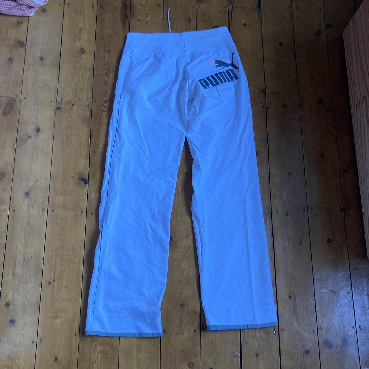 White trackies from puma size small on label, would... - Depop